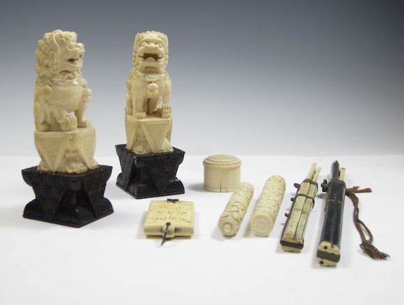 Bonhams : A pair of carved ivory lion dogs and a small collection of ...