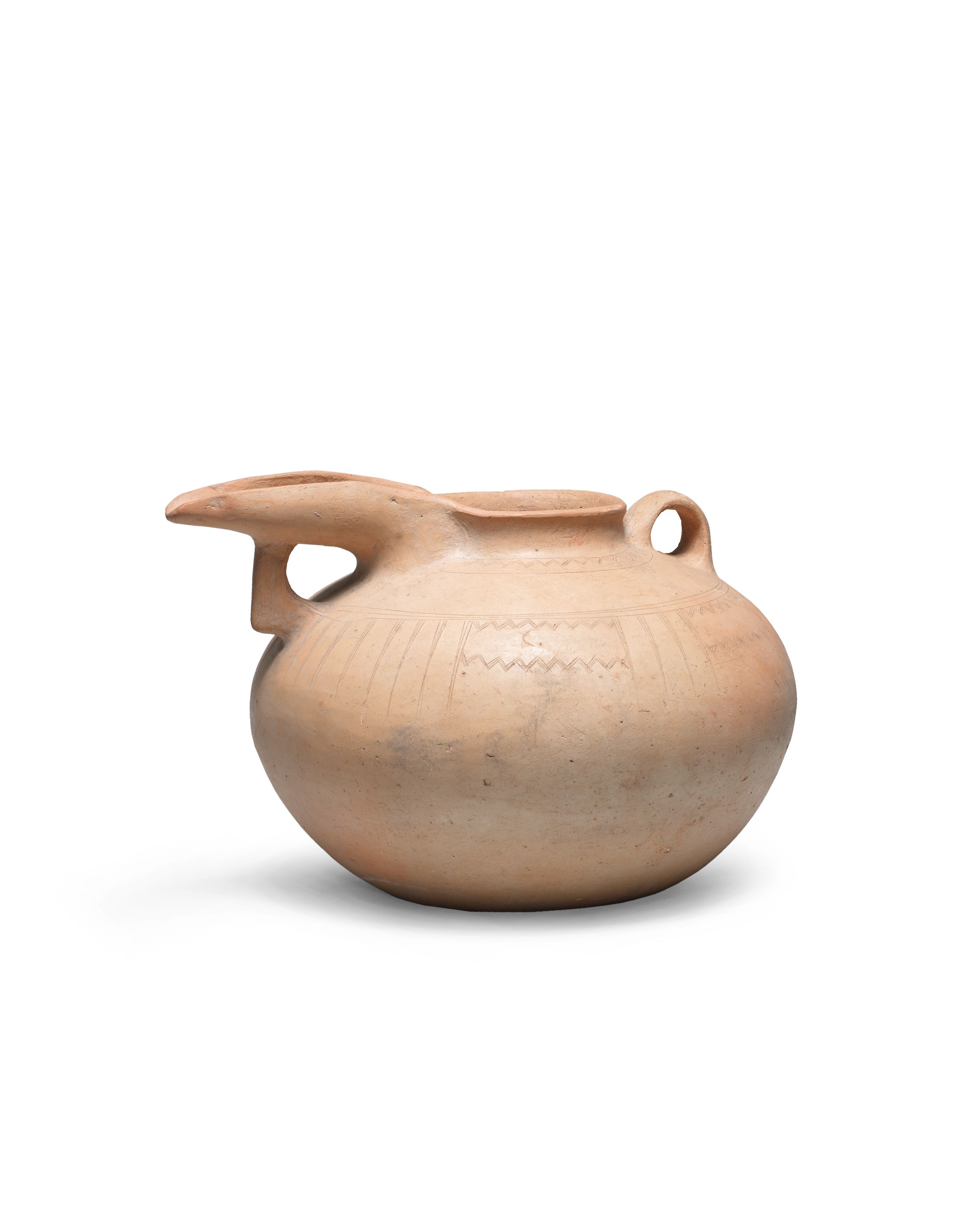 Bonhams : An Iranian buff pottery bridge-spouted vessel