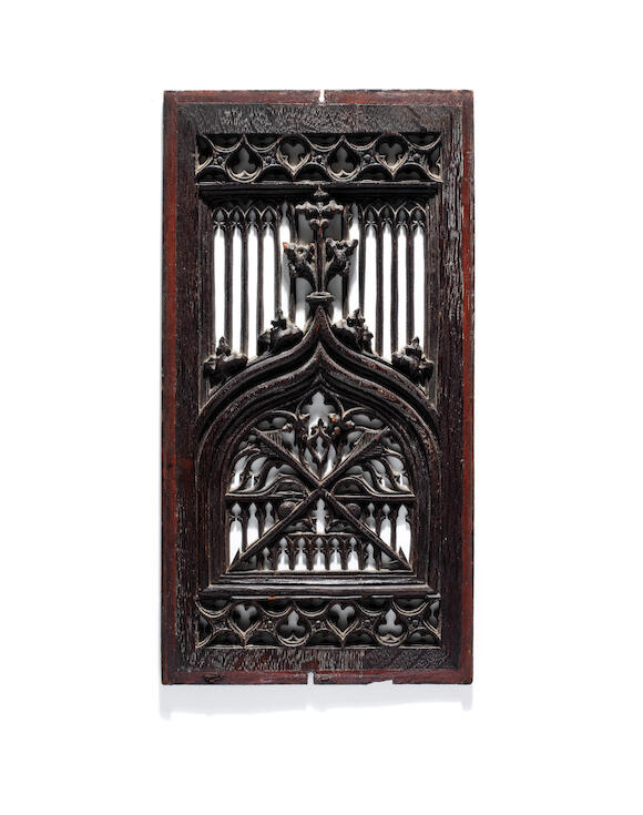 Bonhams : A delicately-carved late 15th century carved oak tracery panel, French, circa 1500