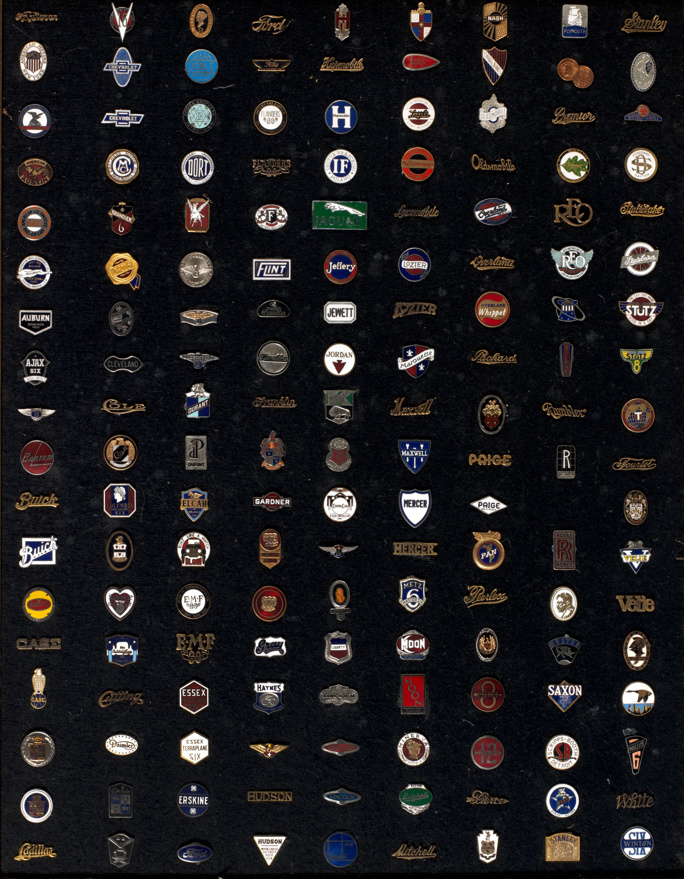 Bonhams Cars : A framed display of 161 assorted marque enamelled lapel ...