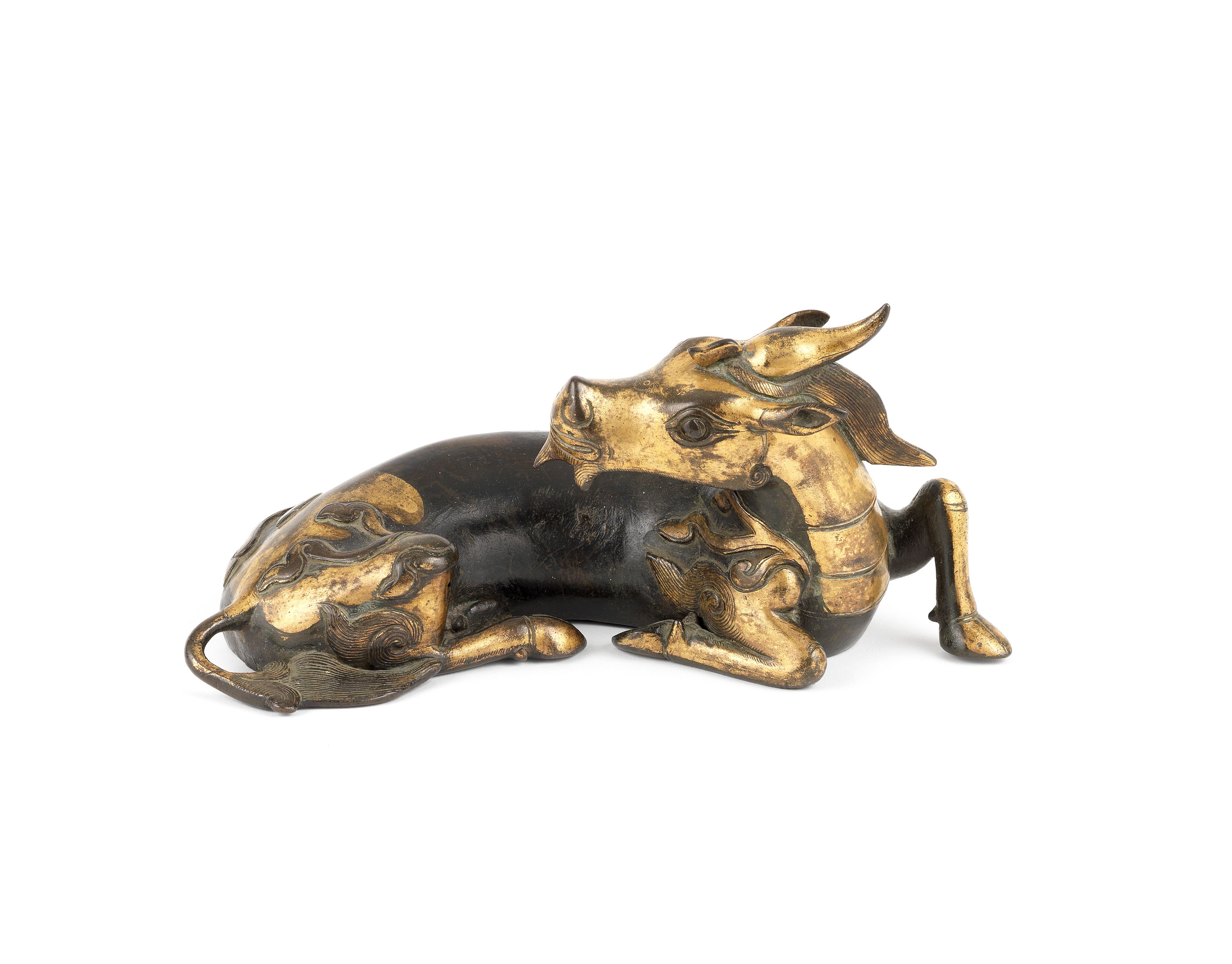 Bonhams : A parcel-gilt bronze model of a mythical beast, Xiniu Ming ...