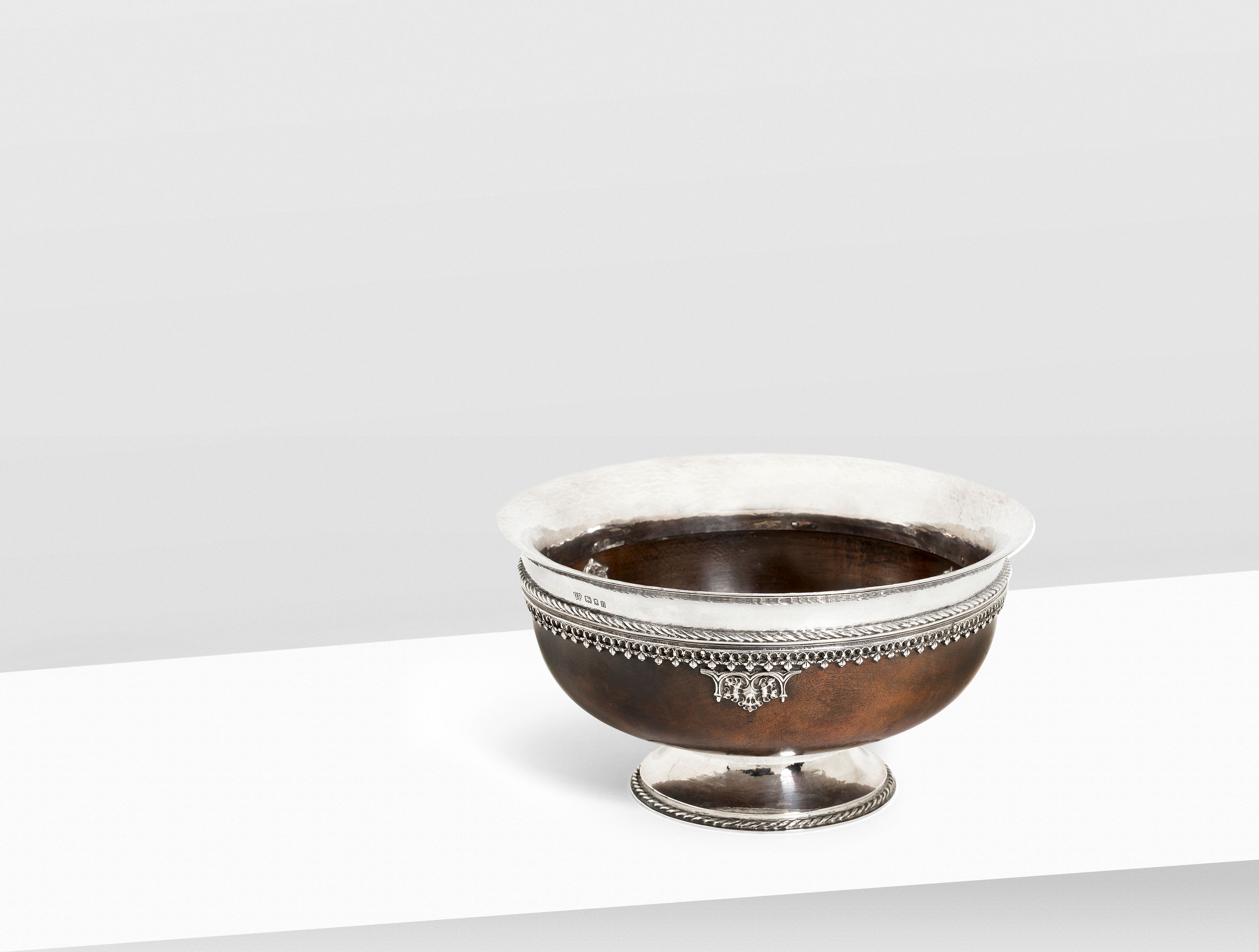Bonhams : OMAR RAMSDEN A silver-mounted and enamelled maple wood mazer ...