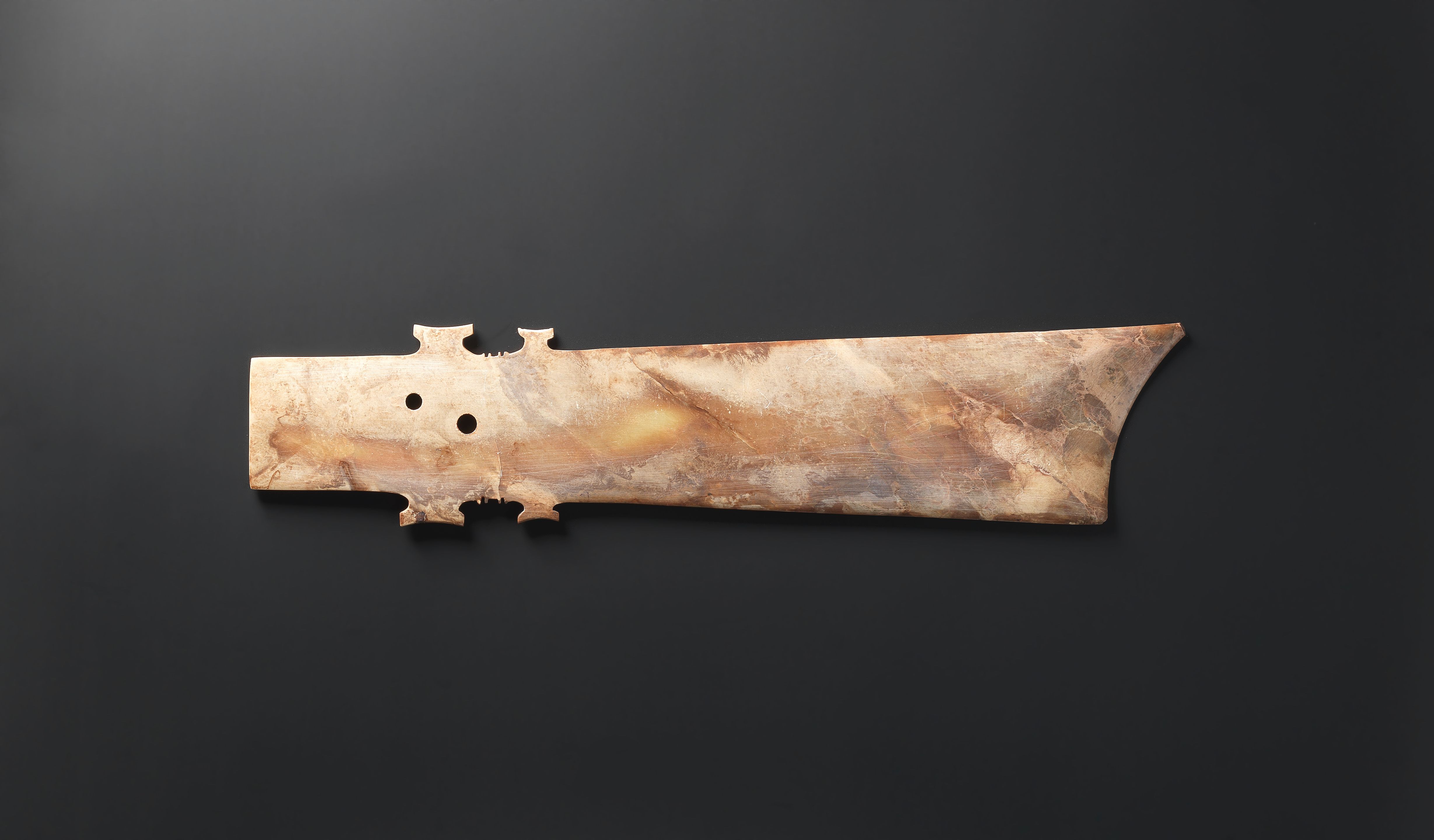 Bonhams : A rare and large mottled beige jade blade, yazhang Neolithic ...