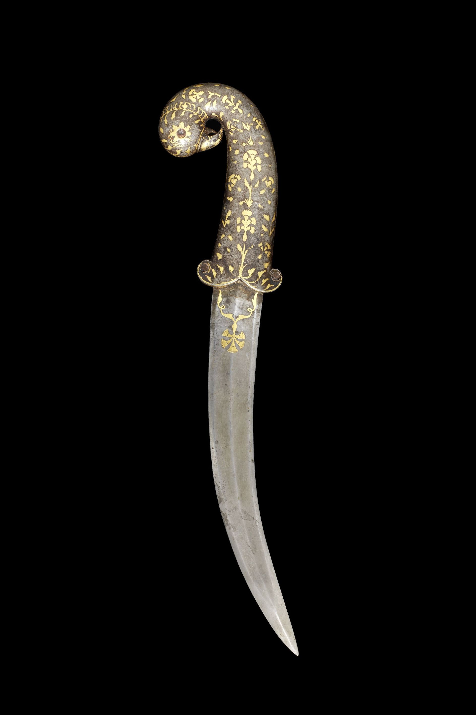 Bonhams : A gold inlaid steel bird's head dagger (kanjar) India, 18th ...