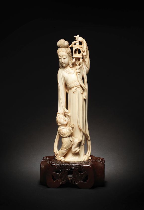 Bonhams : A tall ivory okimono figure of a Chinese maiden with a karako ...