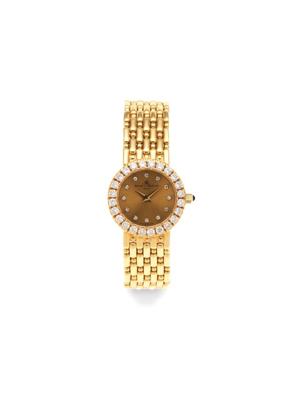 Bonhams : Baume & Mercier. A lady's 18K gold and diamond set quartz ...