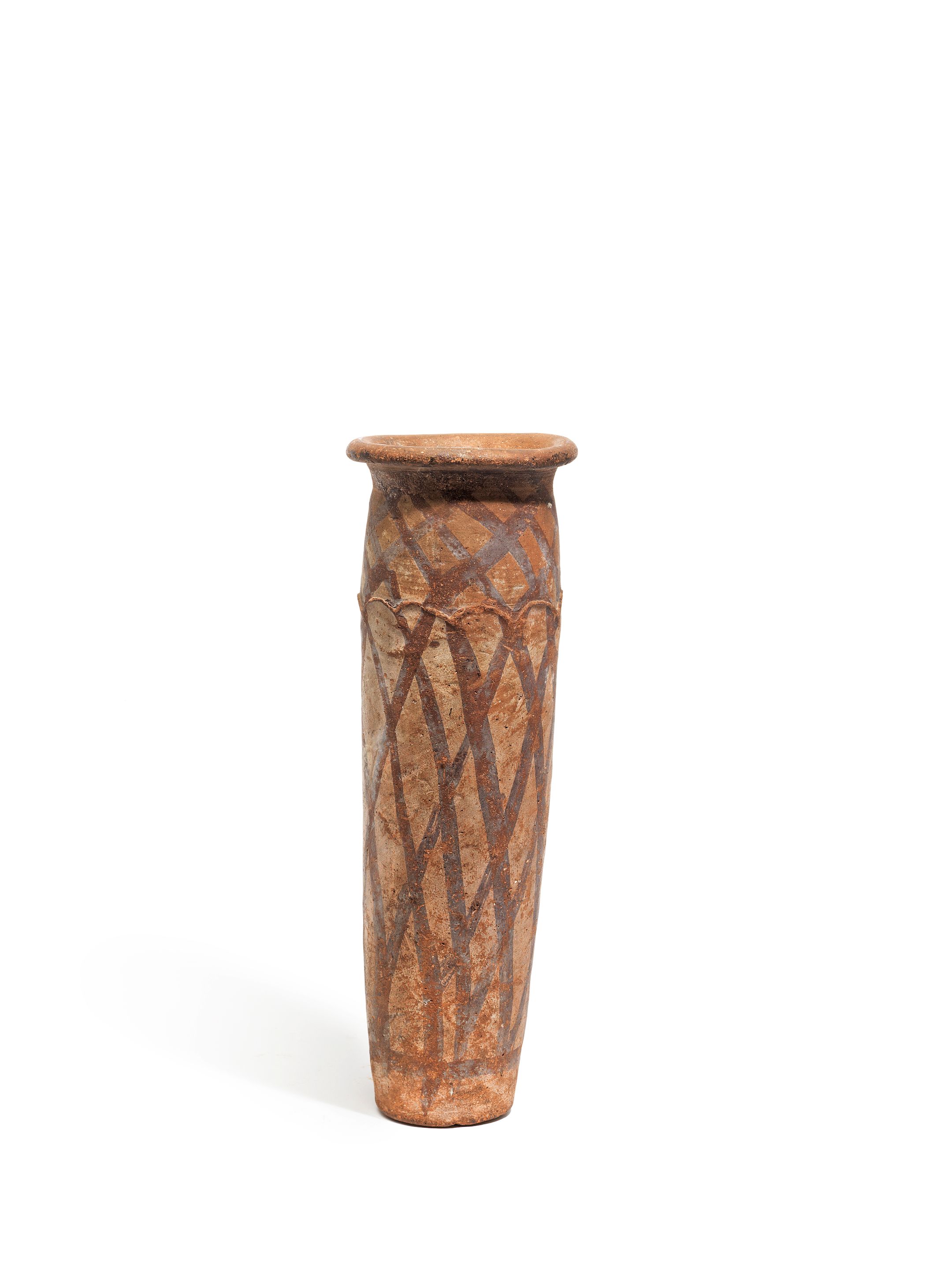 Bonhams : An Egyptian pottery wavy-handled jar