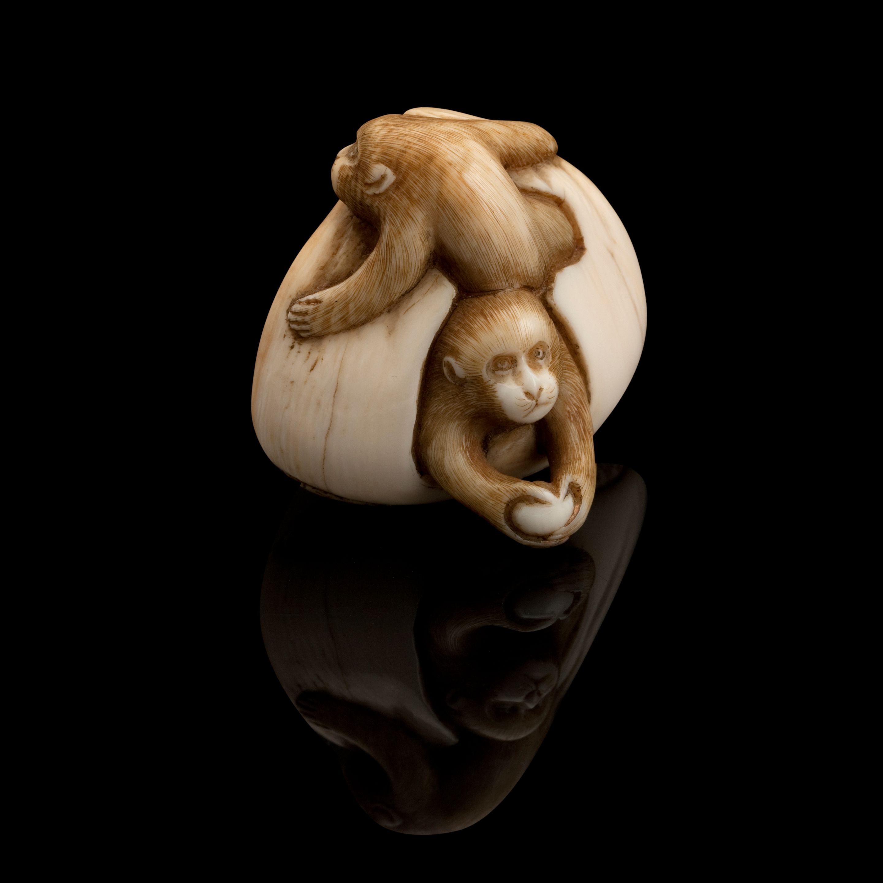 Bonhams : An ivory netsuke of two monkeys By Tomochika, 19th century