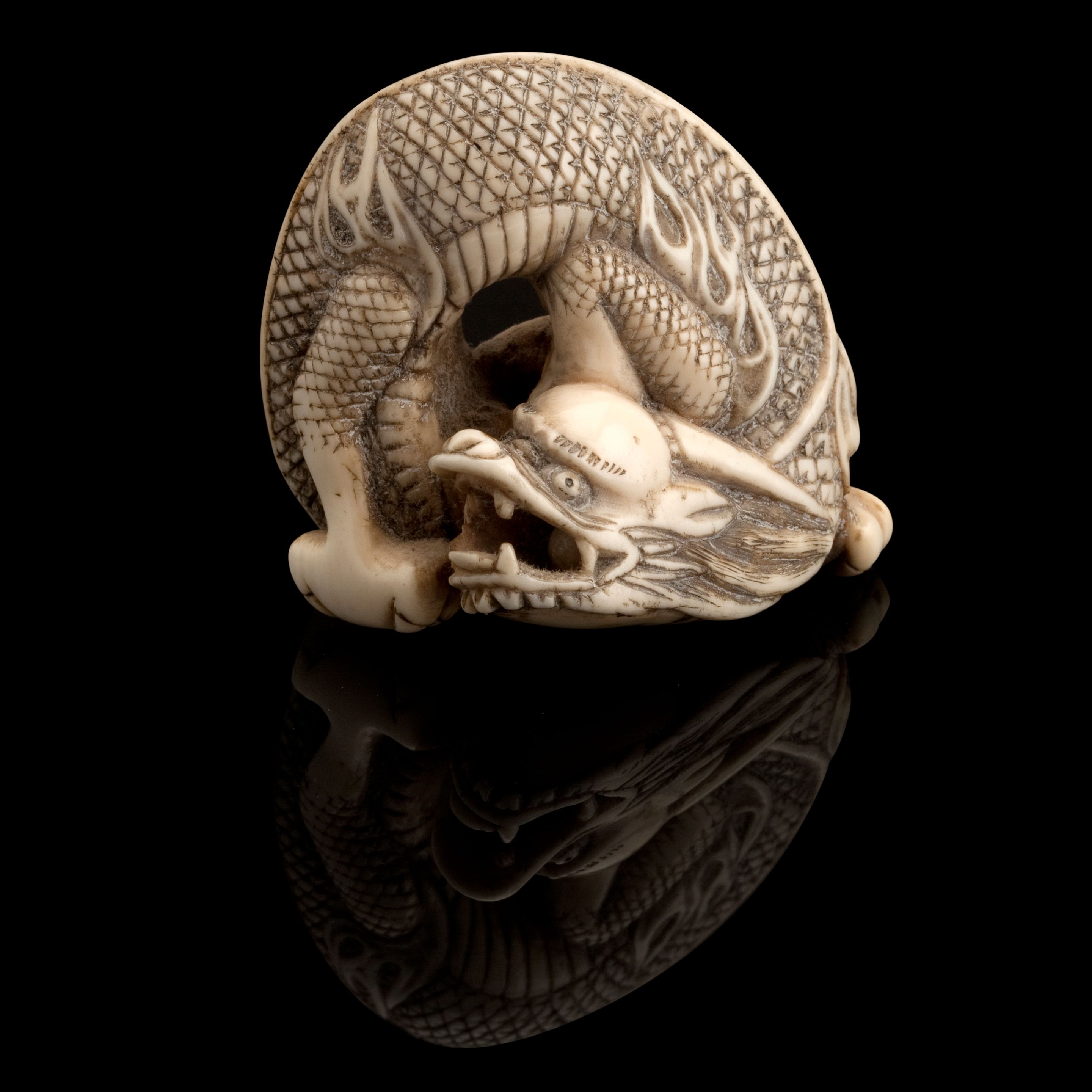 Bonhams : An ivory netsuke of a dragon Edo period, 18th/19th century