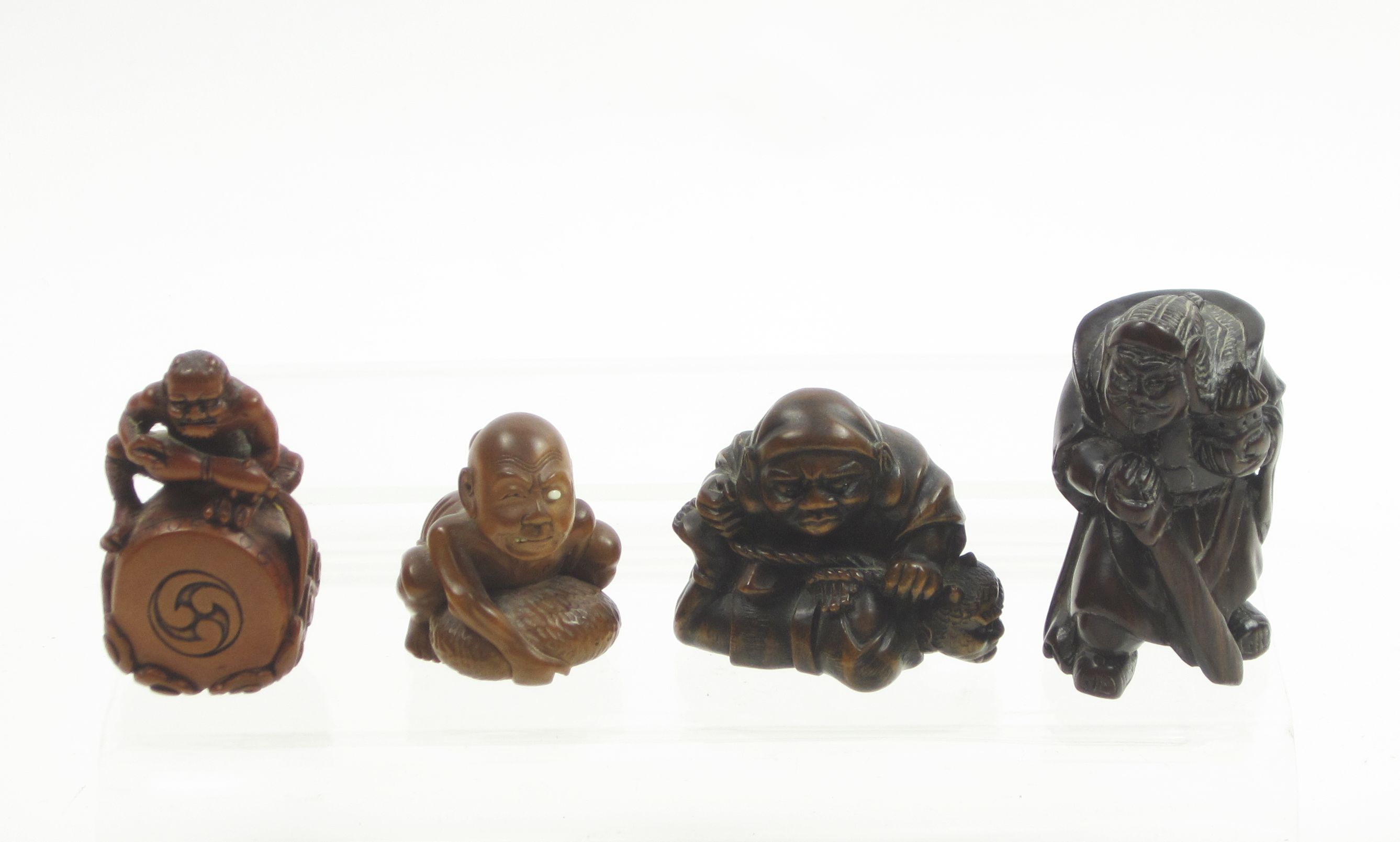 Bonhams : Four wood netsuke Meiji era and later (4)