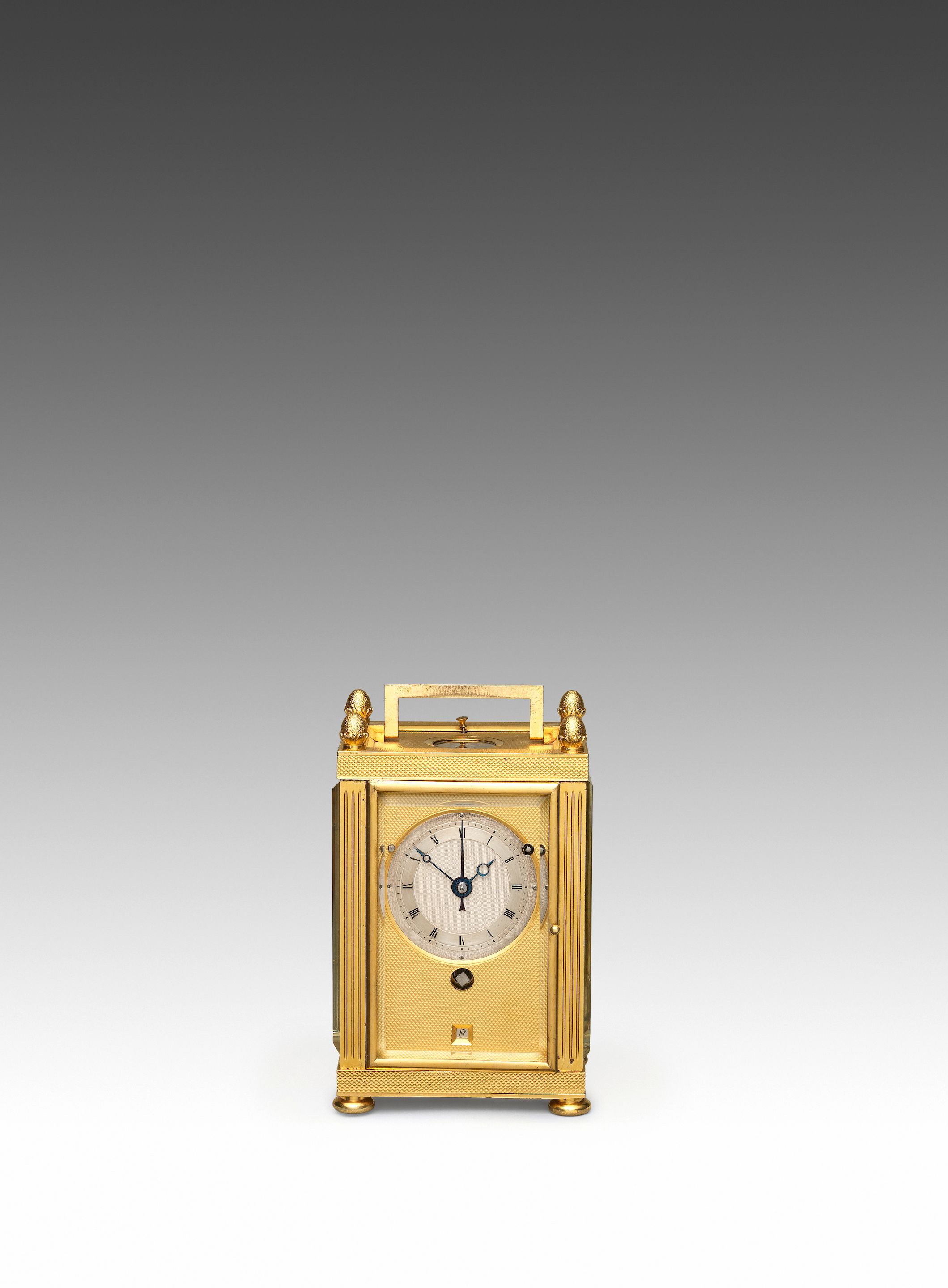 A fine and rare early 19th century Swiss ormolu travelling clock with ...