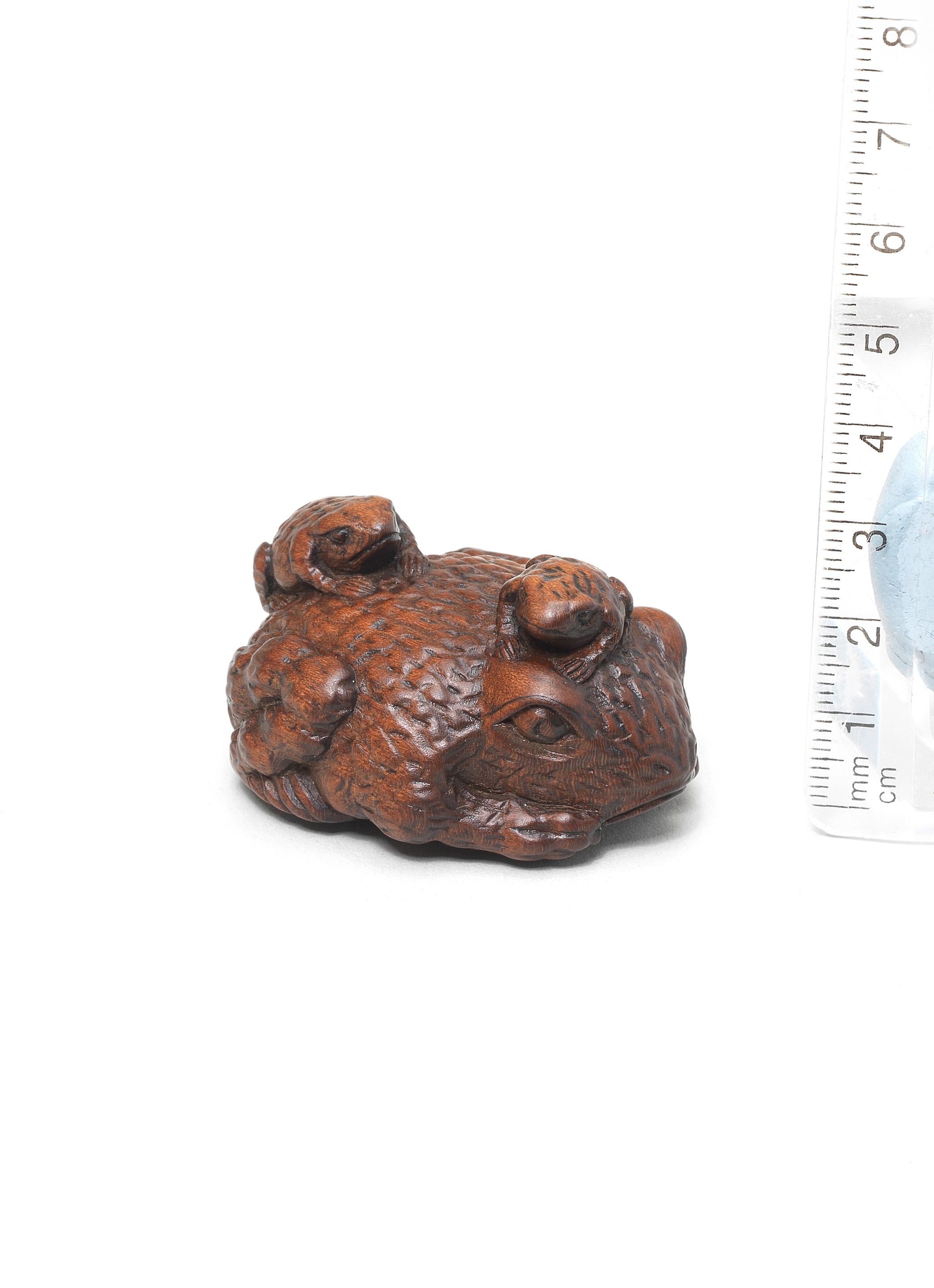Bonhams : A wood netsuke of a toad and young By Tametaka, Nagoya, 18th ...