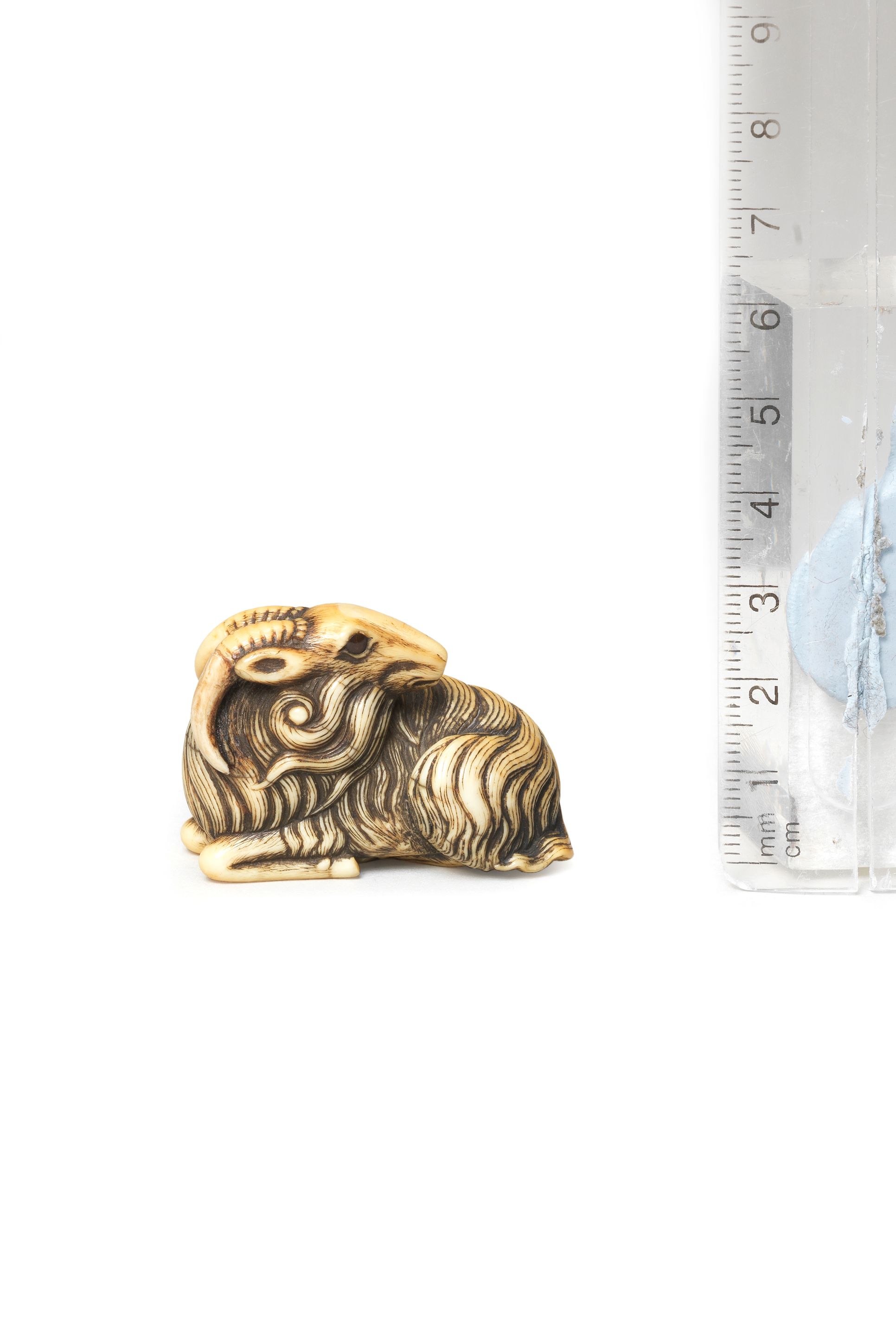 Bonhams : An ivory netsuke of a recumbent goat Kyoto, Edo period (1615 ...