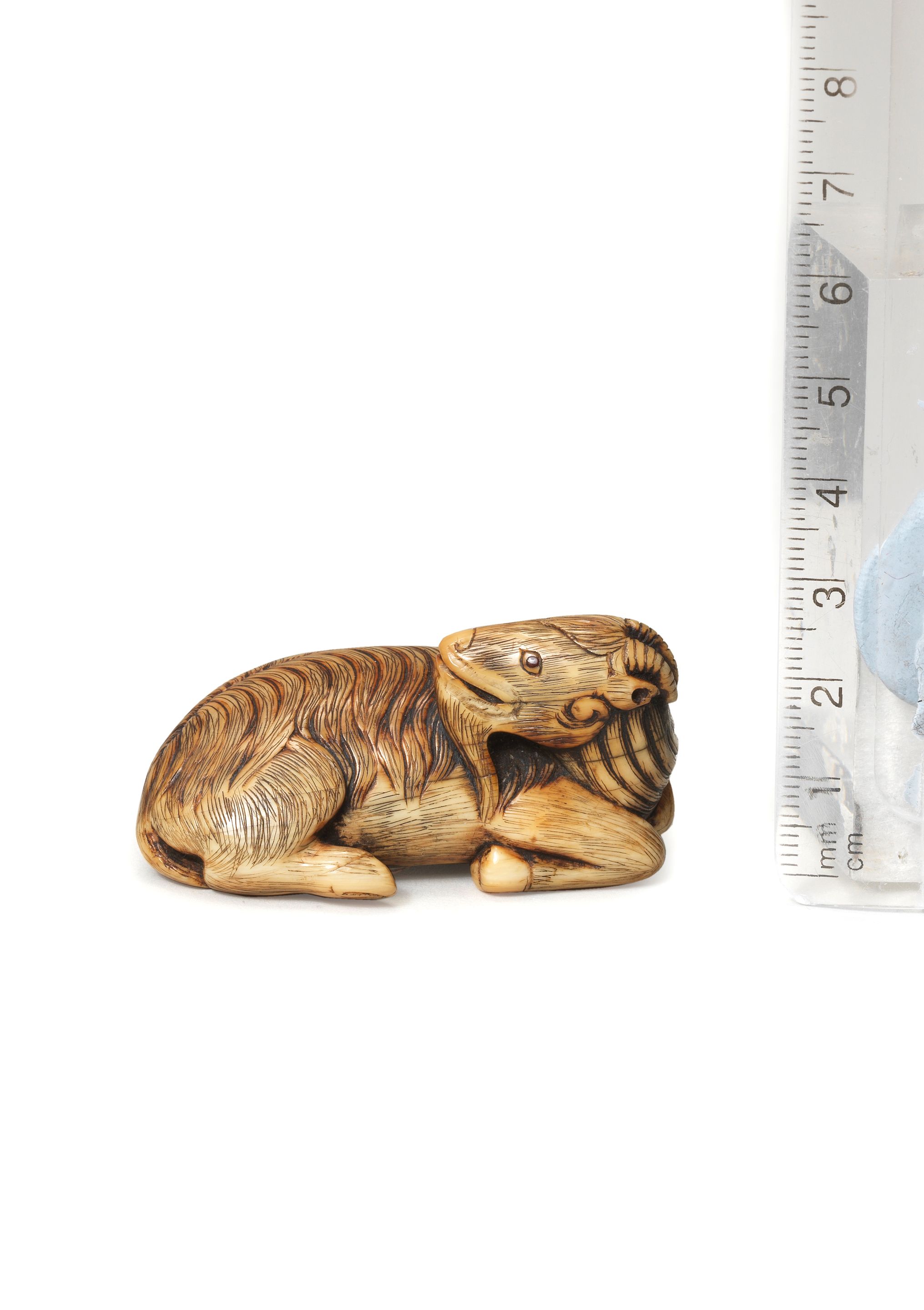 Bonhams : An ivory netsuke of a recumbent goat Edo period (1615-1868 ...
