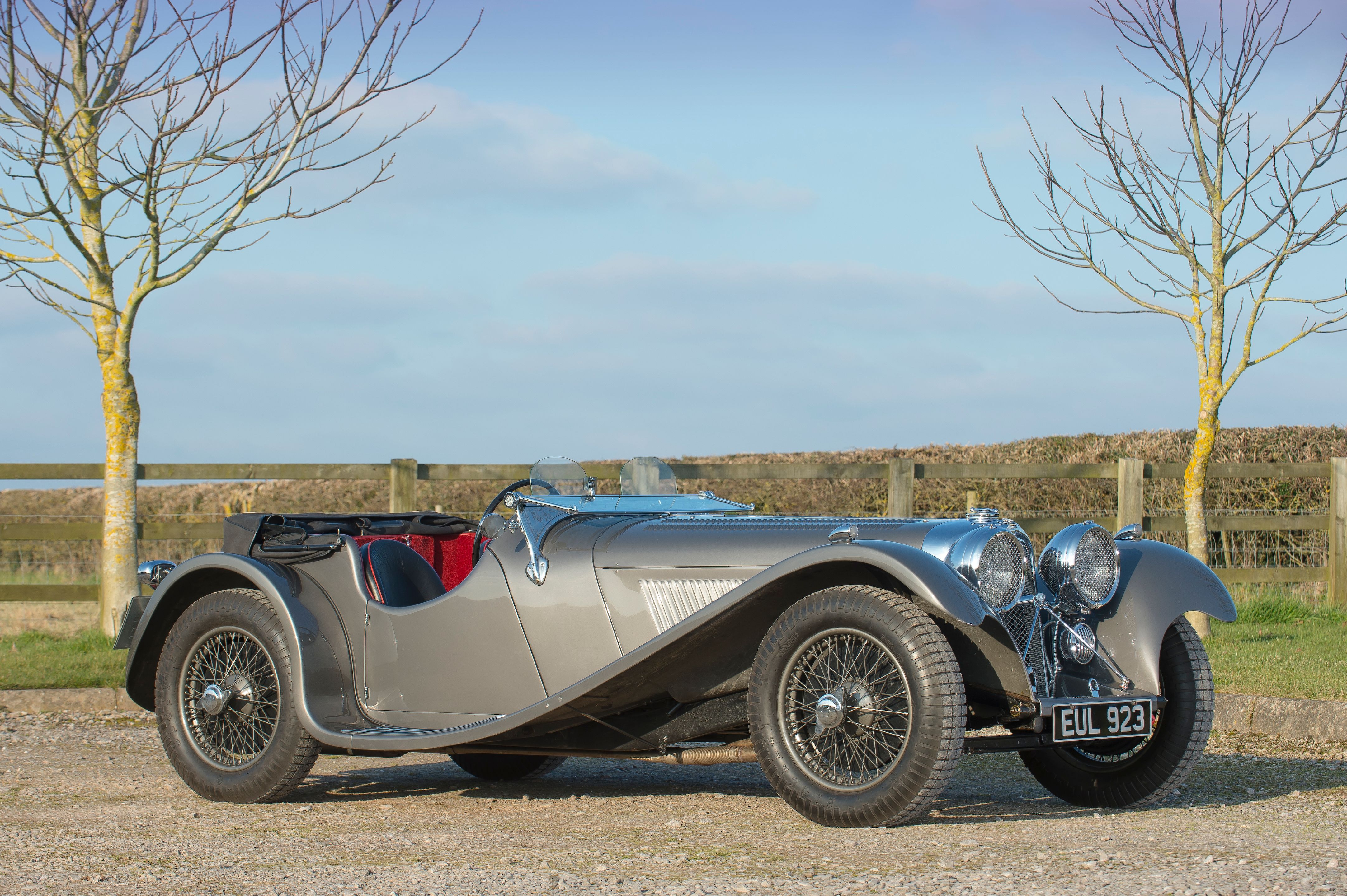 1938 Jaguar SS100 (in display case - auctions & price archive