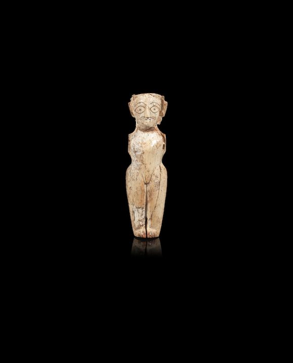 Bonhams : A Fatimid ivory figure Egypt, 10th/ 11th Century