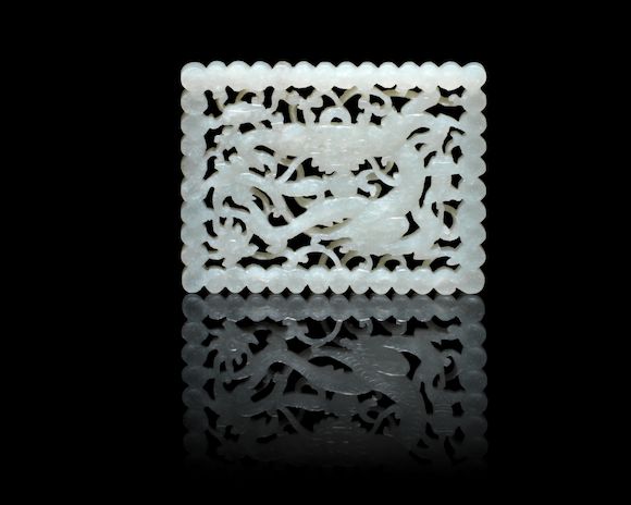 Bonhams : A pale green reticulated 'dragon' plaque 16th/17th century