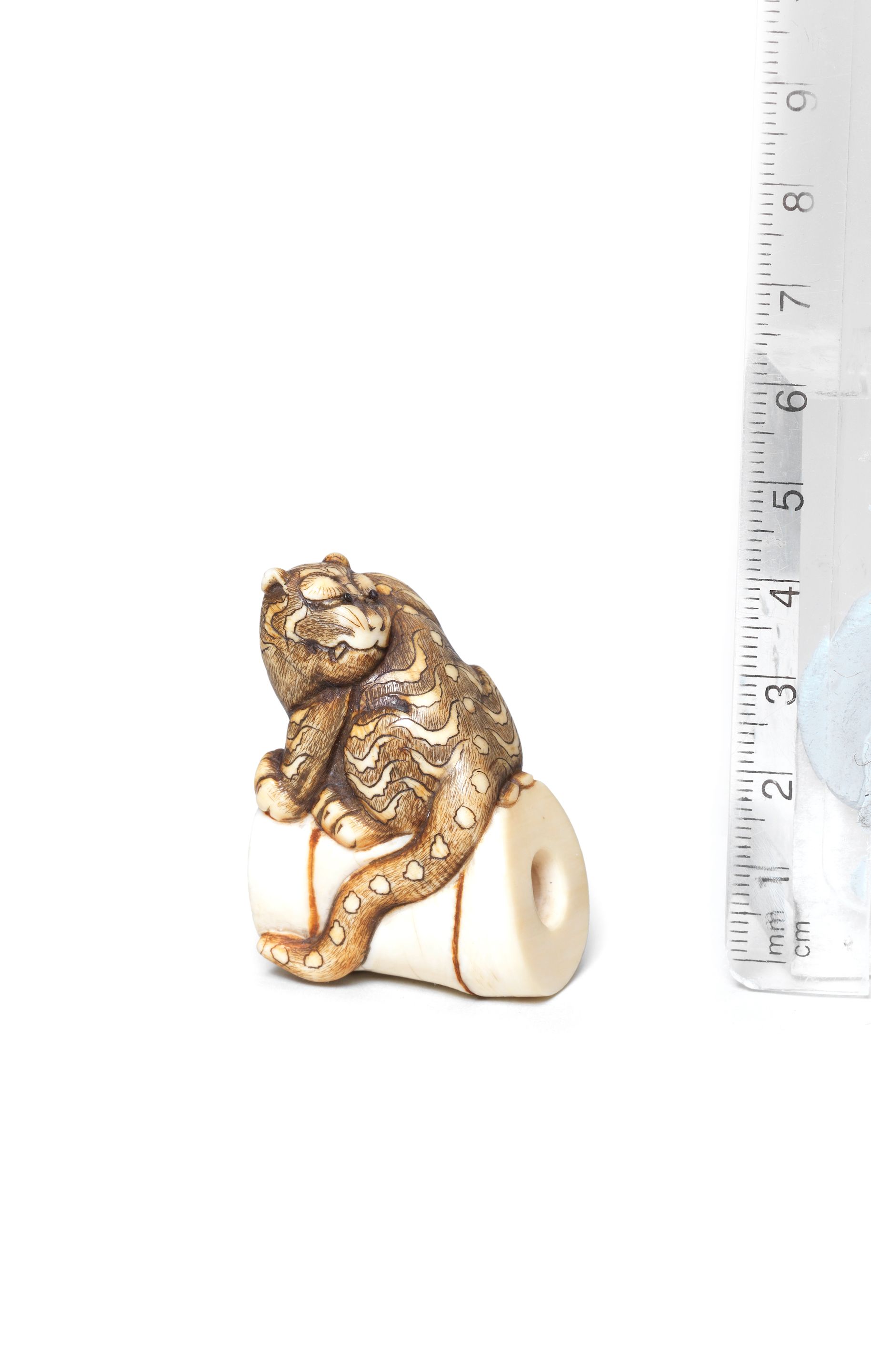 Bonhams : An ivory netsuke of a tiger on bamboo Edo period (1615-1868 ...