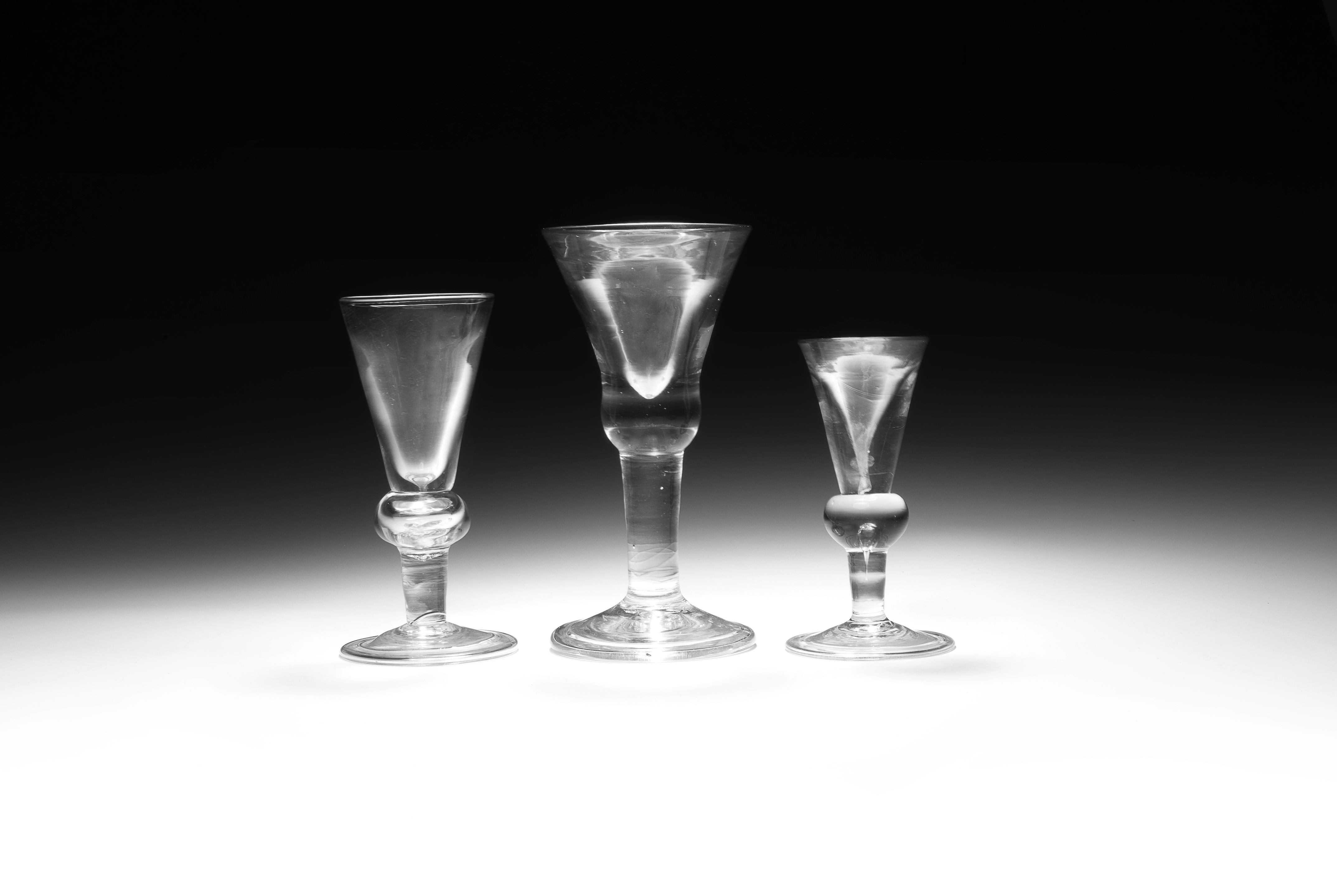 Bonhams : A very heavy deceptive or toastmaster's glass, circa 1720-30