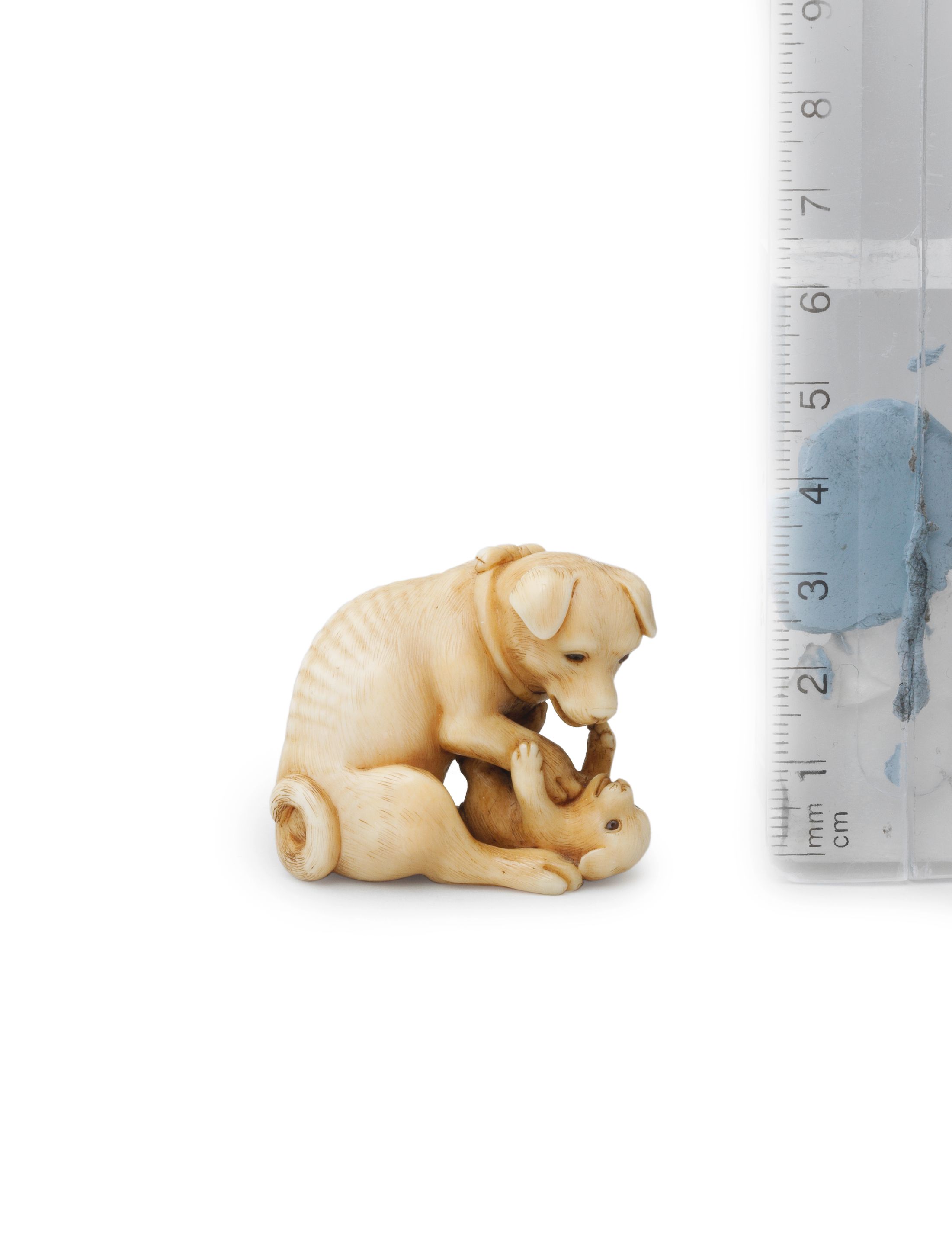 Bonhams : An ivory netsuke of a dog and pup By Tanenaga, Edo period ...