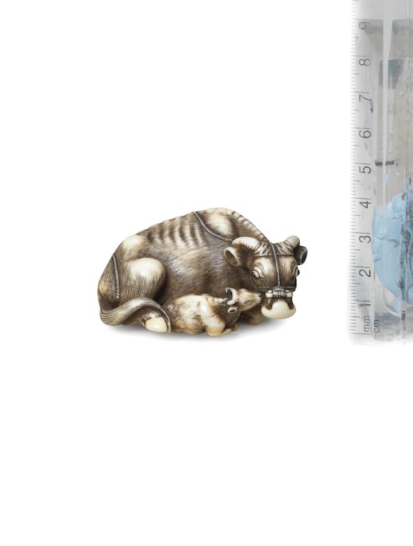 Bonhams : An ivory netsuke of a cow and calf By Tomotada, Kyoto, Edo ...