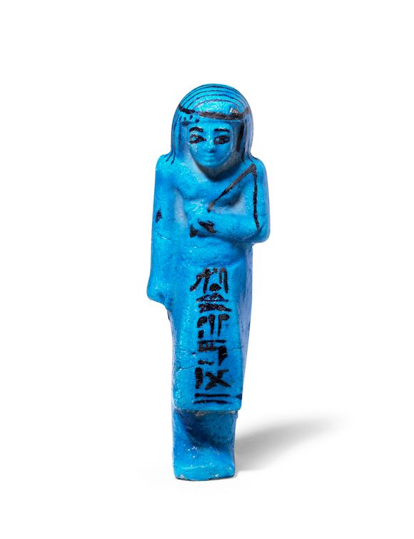 Bonhams : An Egyptian bright blue glazed composition overseer shabti of ...
