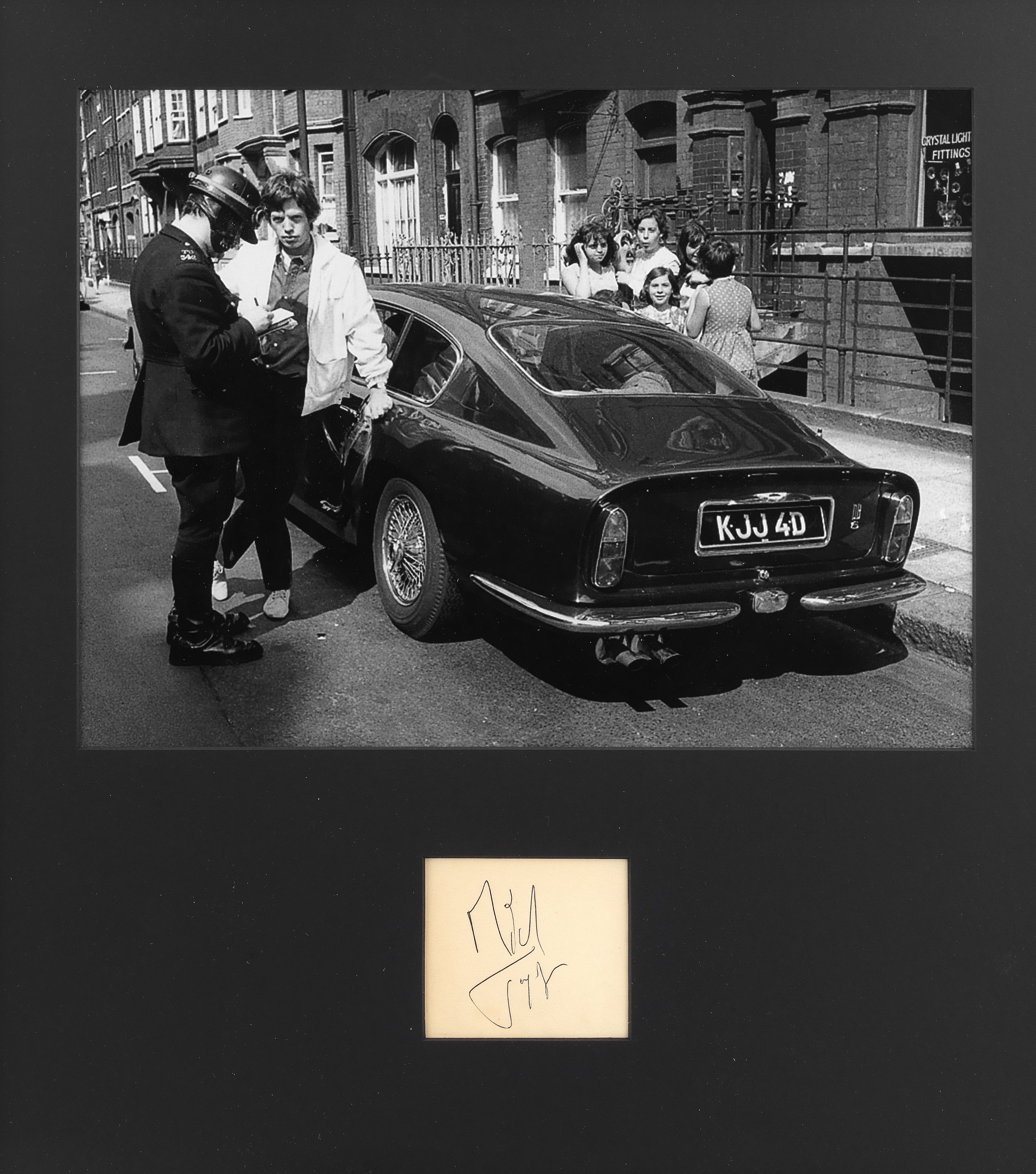 Bonhams Cars : A PHOTOGRAPH OF A POLICE OFFICER TALKING TO MICK JAGGER ...