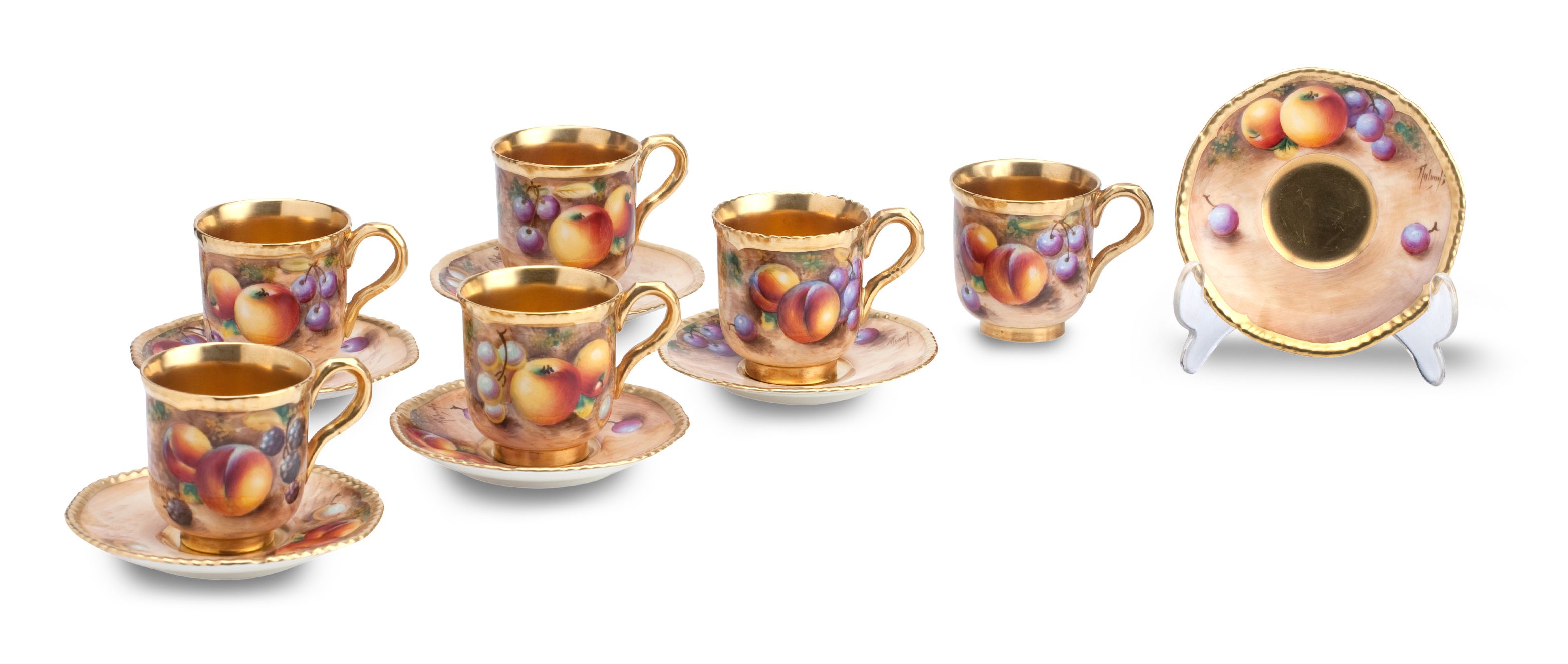 Bonhams : A set of six Royal Worcester fruit painted coffee cans and saucers Post-war