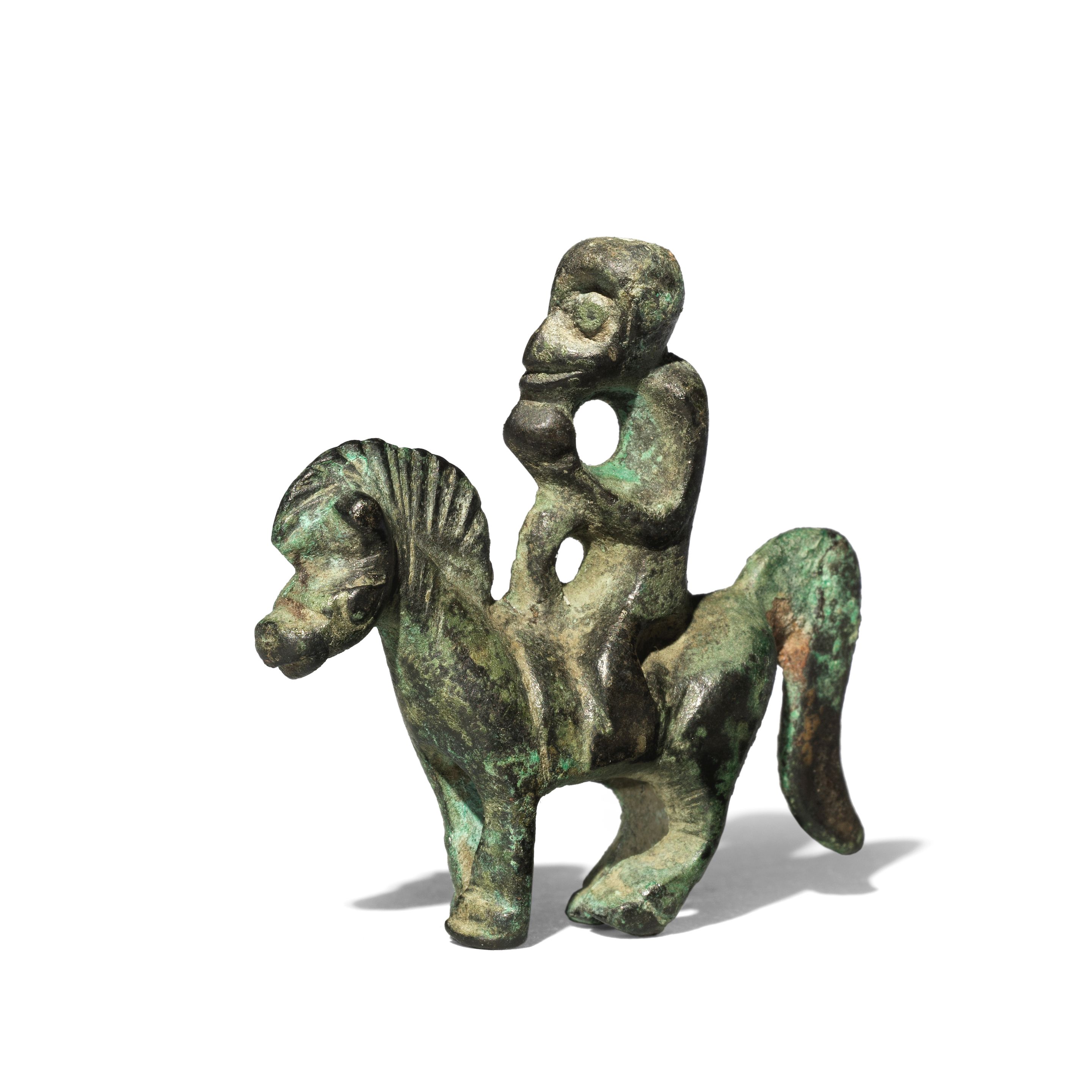 Bonhams : A Sino-Siberian bronze monkey riding a horse