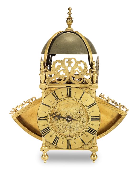 Bonhams : A brass winged lantern clock the dial signed Roger Moore, Ipswich