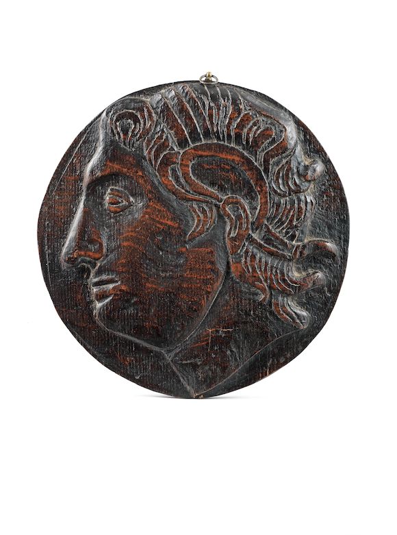Bonhams : A 19th century carved oak roundel, depicting Alexander the Great