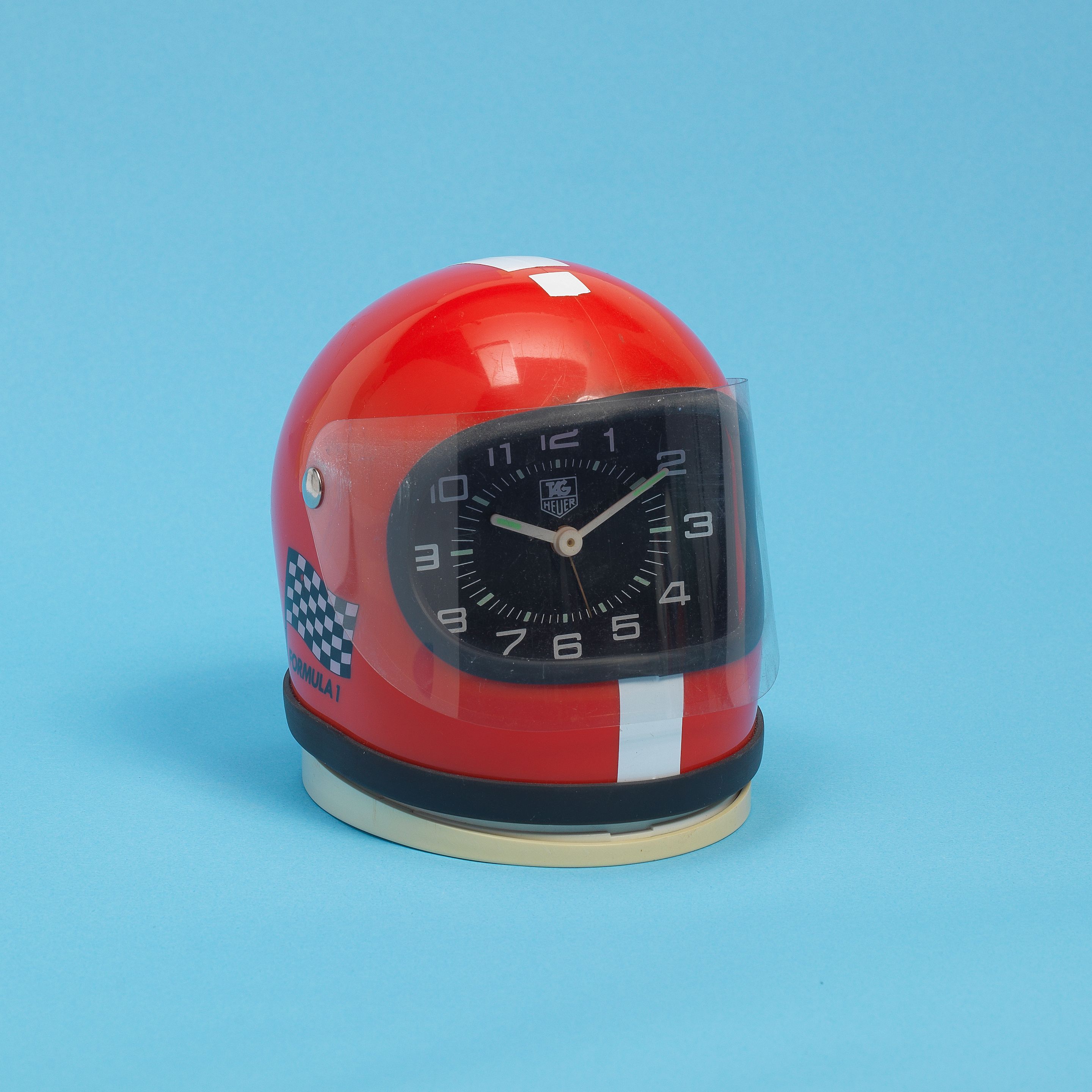 Bonhams : TAG Heuer. A miniature racing helmet desk clock with alarm ...
