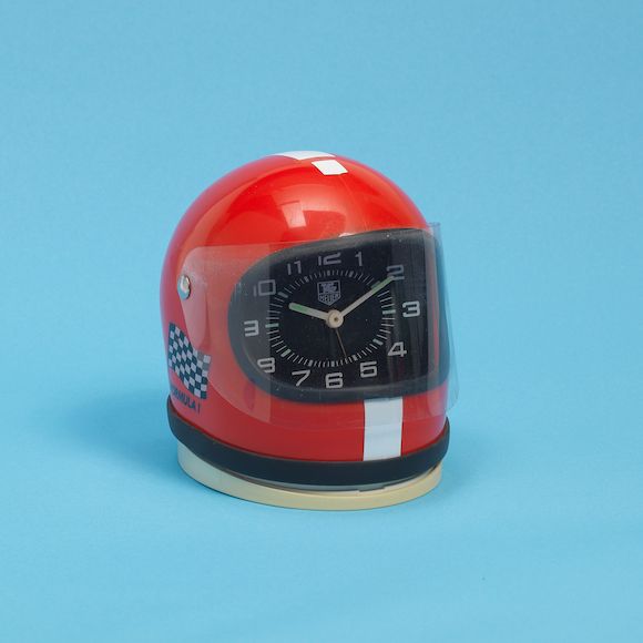 Bonhams : TAG Heuer. A miniature racing helmet desk clock with alarm ...