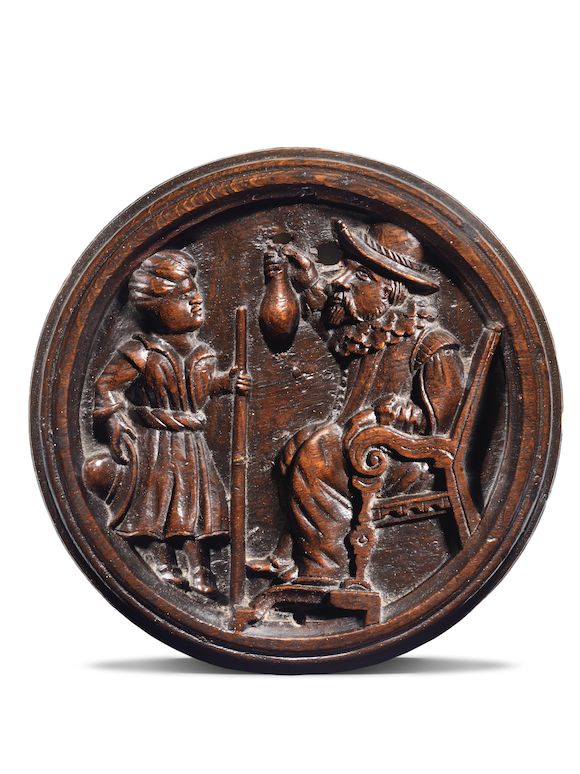 Bonhams : A very rare mid-17th century carved oak 'piss-pot' lid or ...