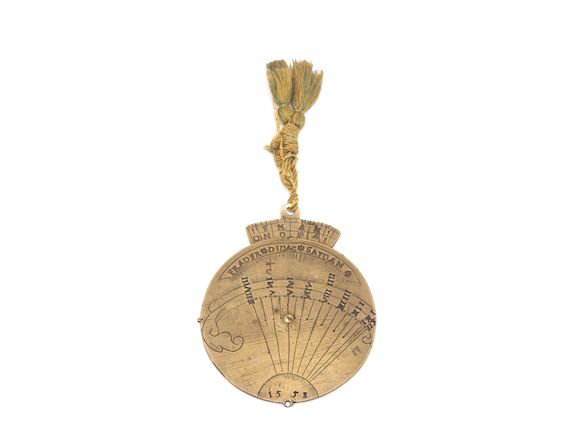 Bonhams : A brass vertical disc dial, probably German, dated 1553,