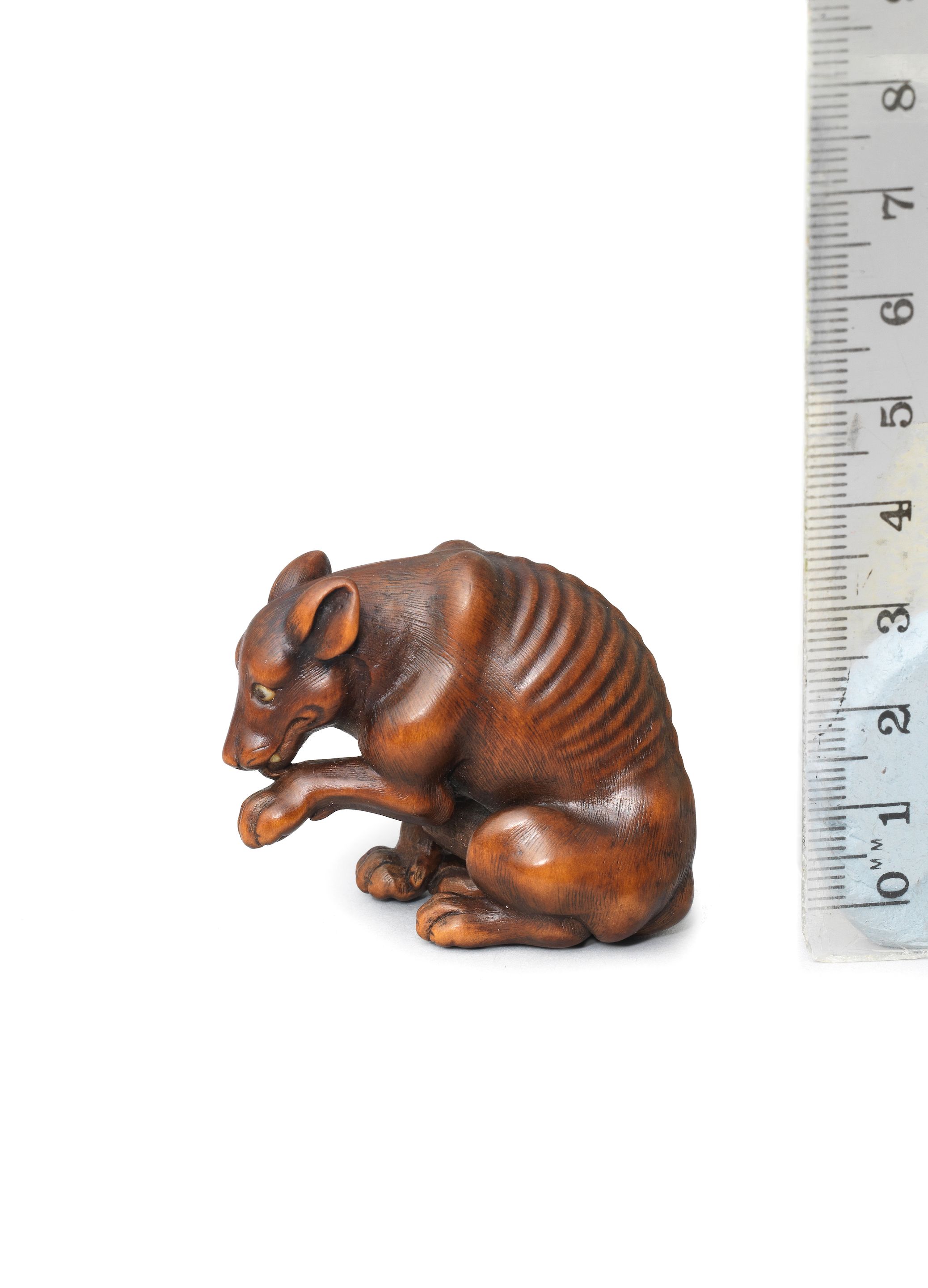 Bonhams : A wood netsuke of a wild dog (yama-inu) By Tomotada, Kyoto ...