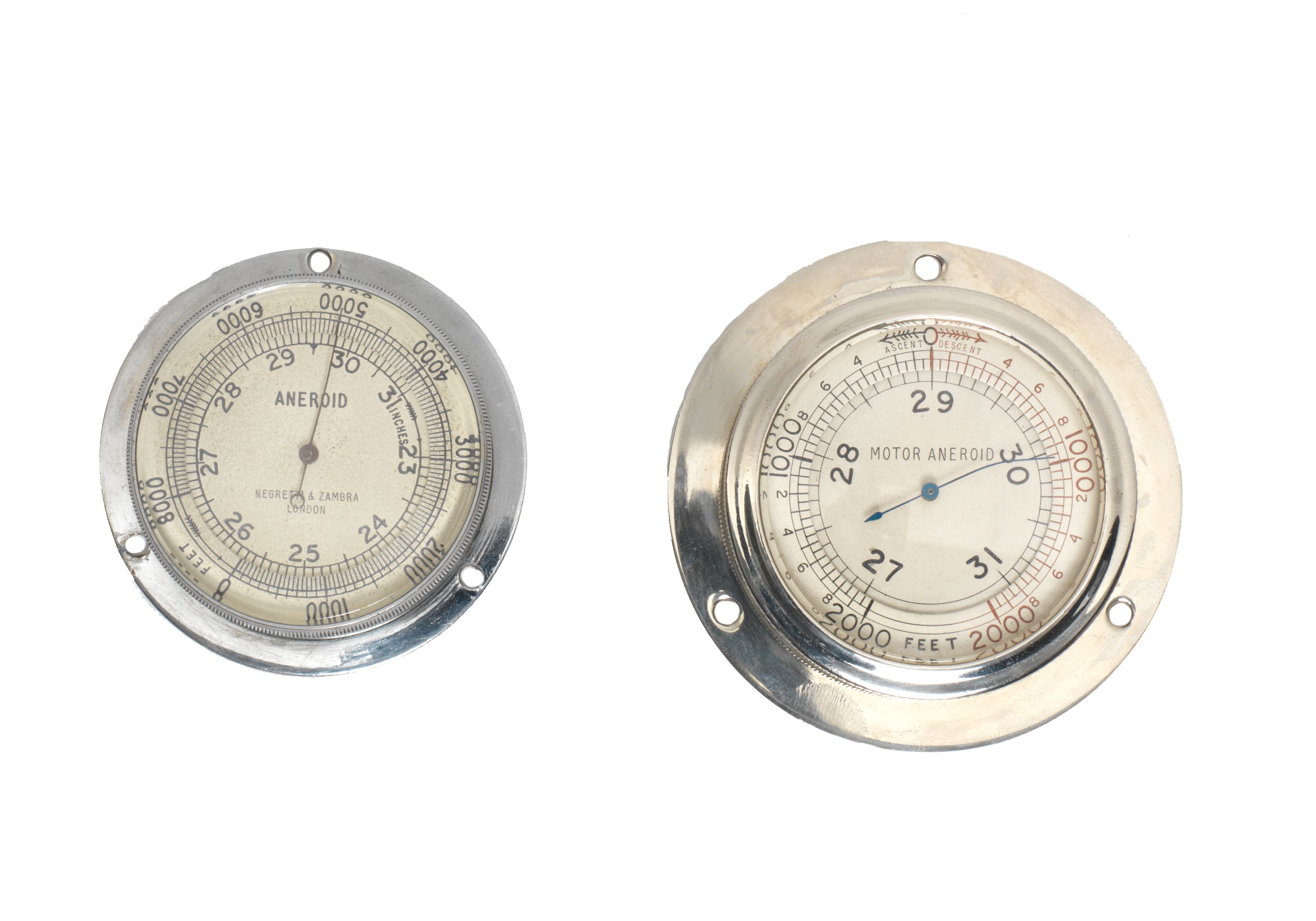 Bonhams Cars : Two motoring aneroid barometers, 1920s, ((2))