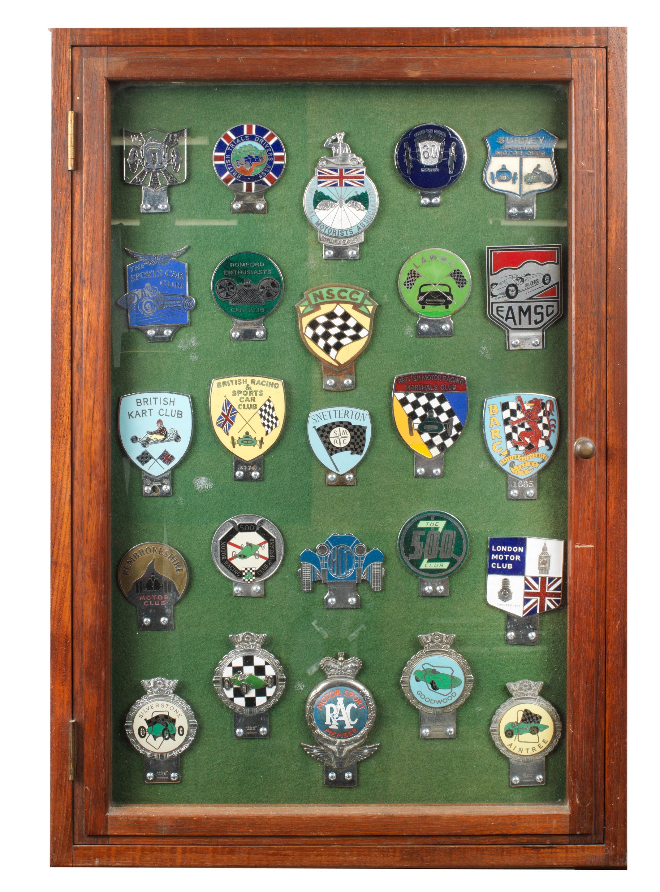 Bonhams Cars : A framed display of 25 pre and post-War car club badges,