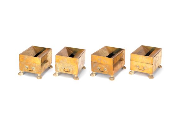 Bonhams : A set of four brass floor-standing cigarette ash boxes ...