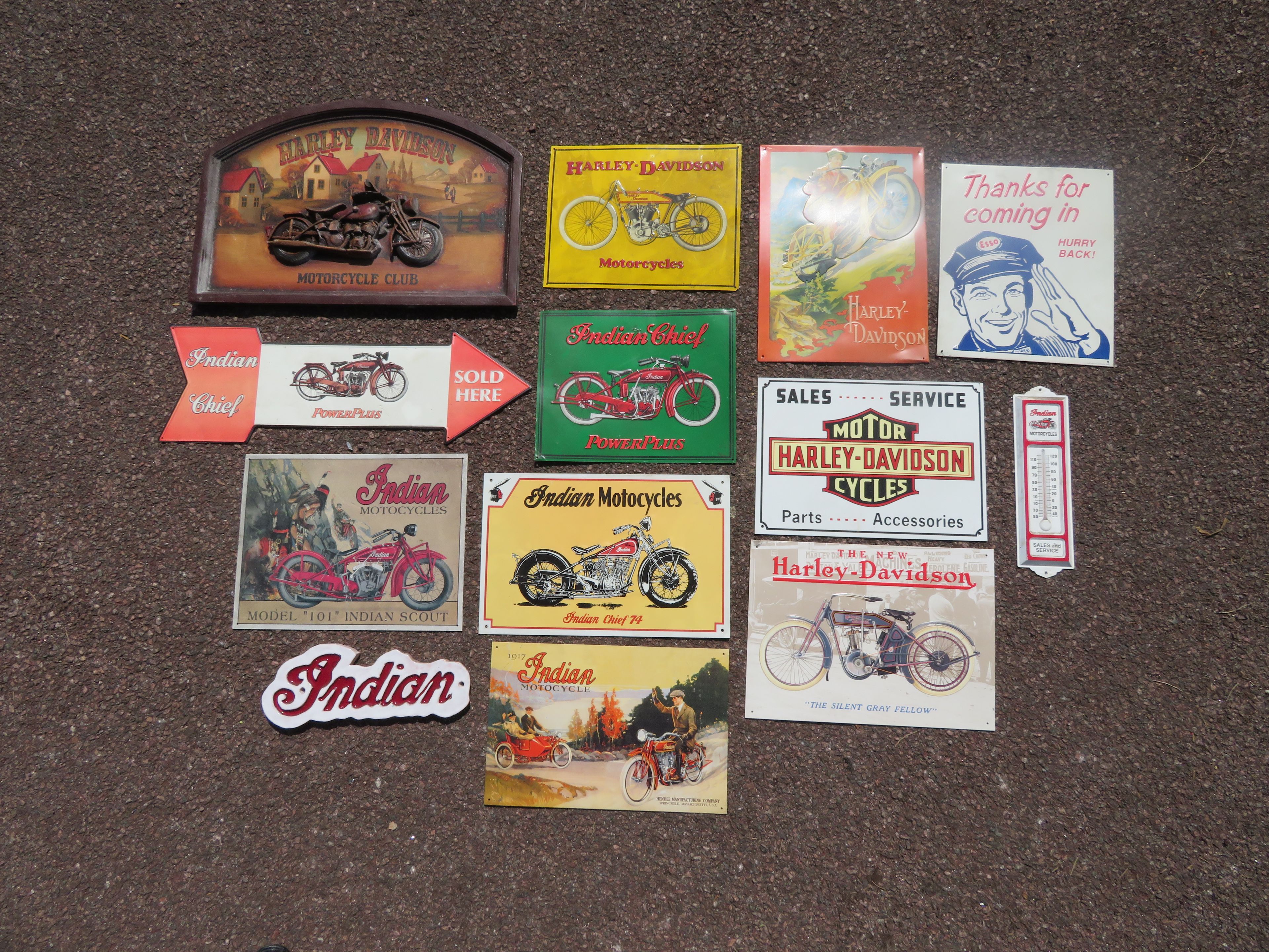Bonhams Cars : An assortment of motorcycle related reproduction signs,