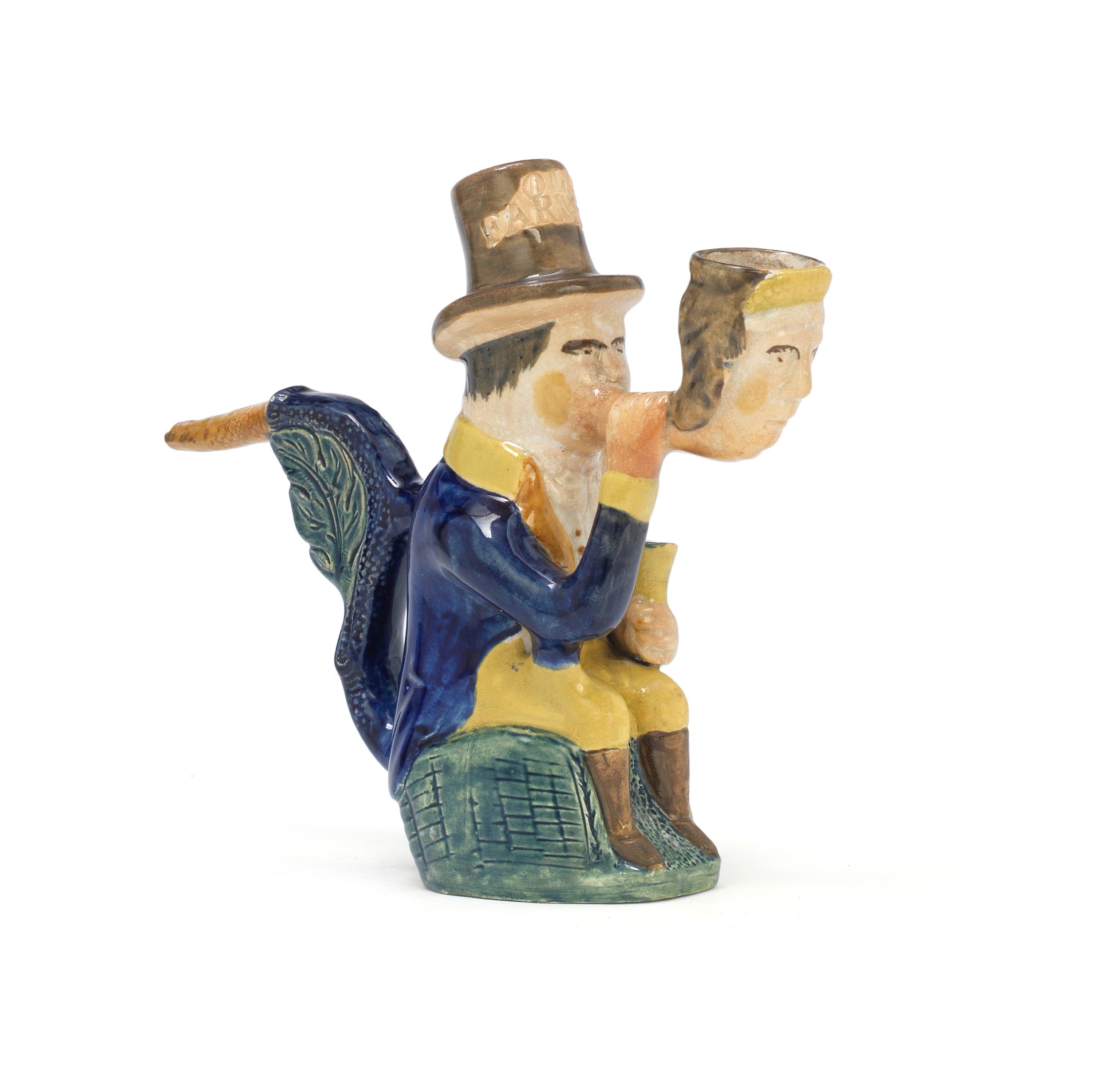 Bonhams : A rare Prattware figural pipe, circa 1800