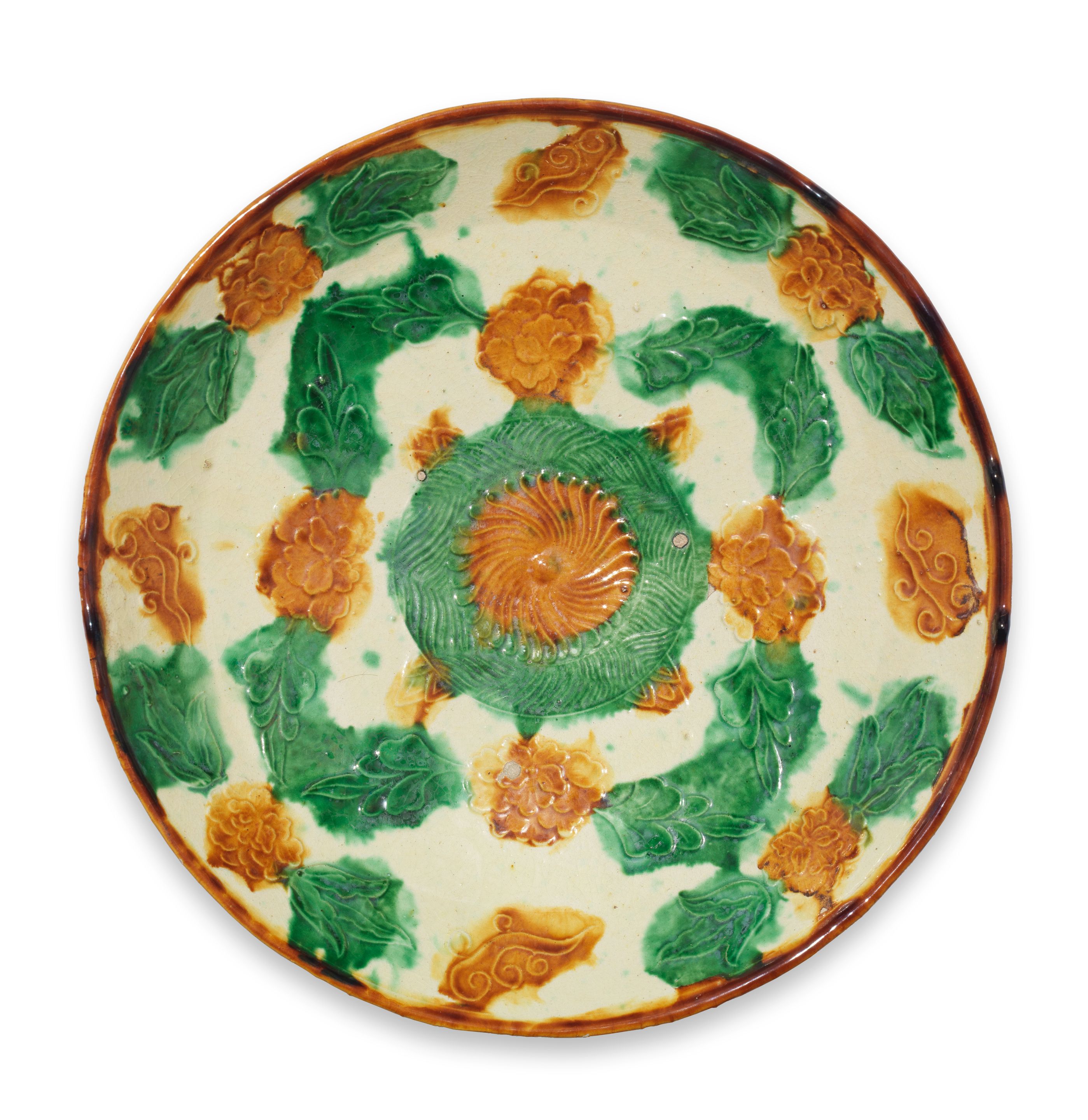 Bonhams : A moulded sancai-glazed 'flower' dish Liao Dynasty