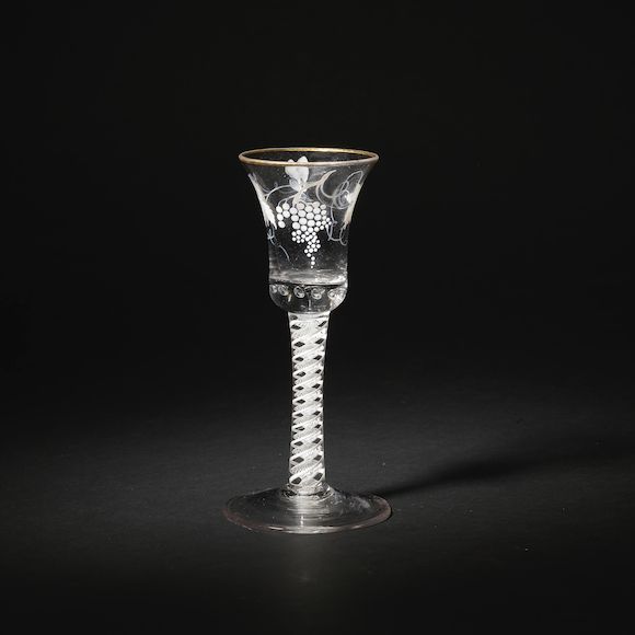 Bonhams : A Beilby enamelled opaque twist wine glass, circa 1765