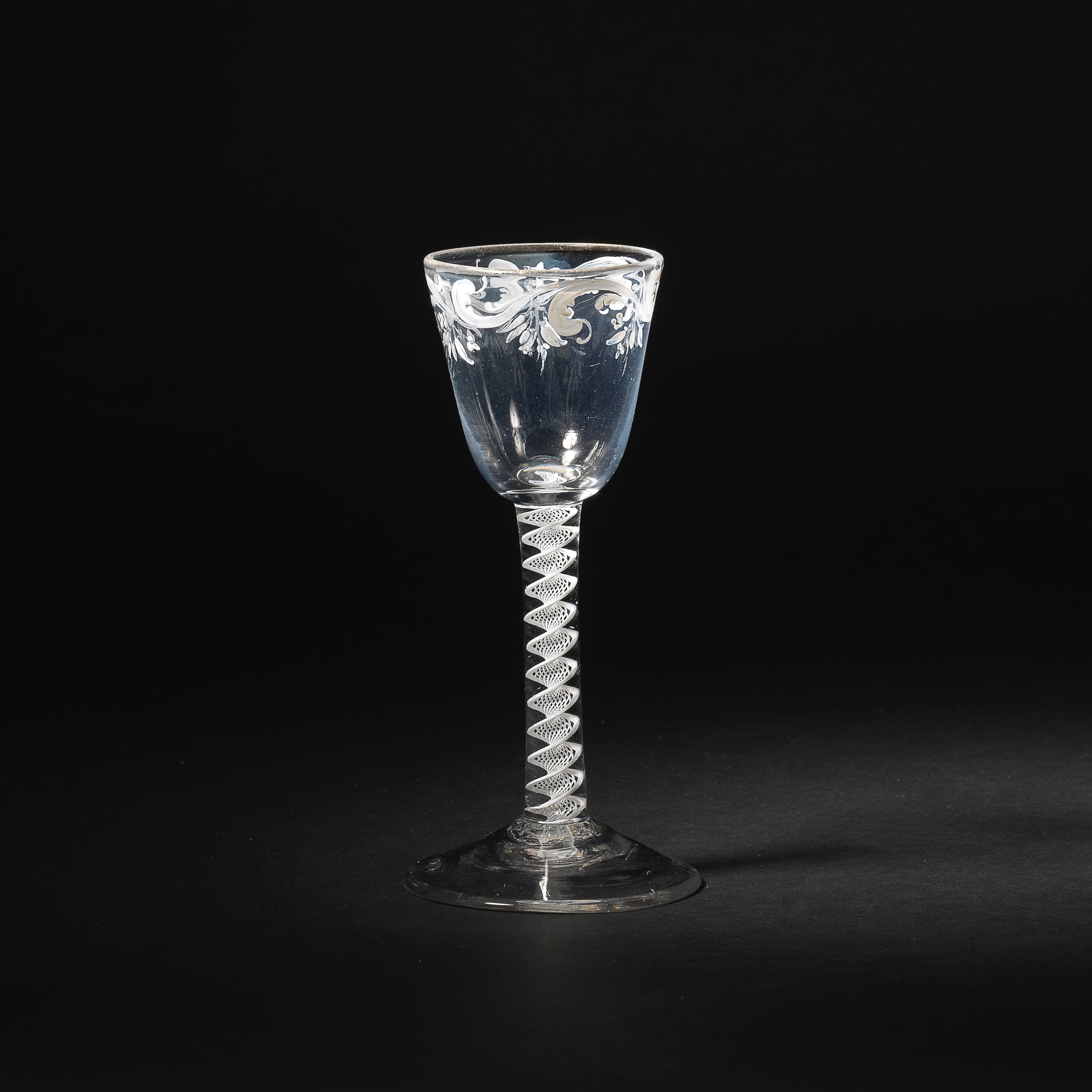 Bonhams : A Beilby enamelled opaque twist wine glass, circa 1765-70
