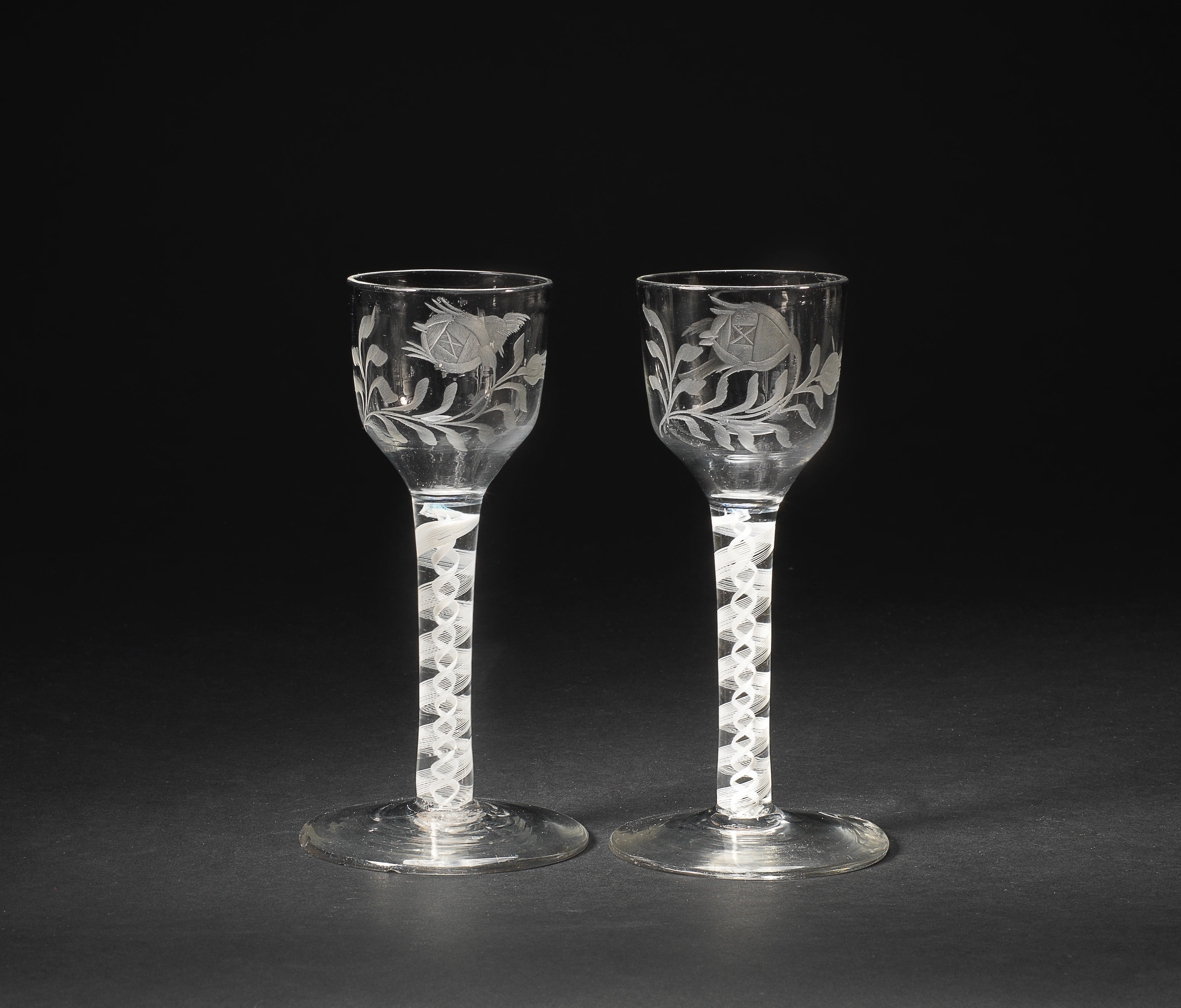Bonhams A Pair Of Engraved Opaque Twist Wine Glasses Circa 1765