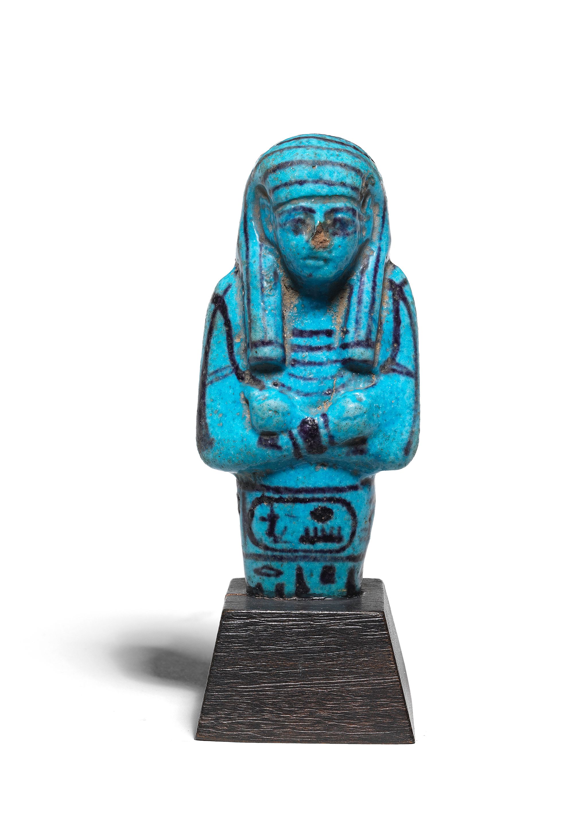 Bonhams : An Egyptian upper part of a bright blue glazed shabti for the ...
