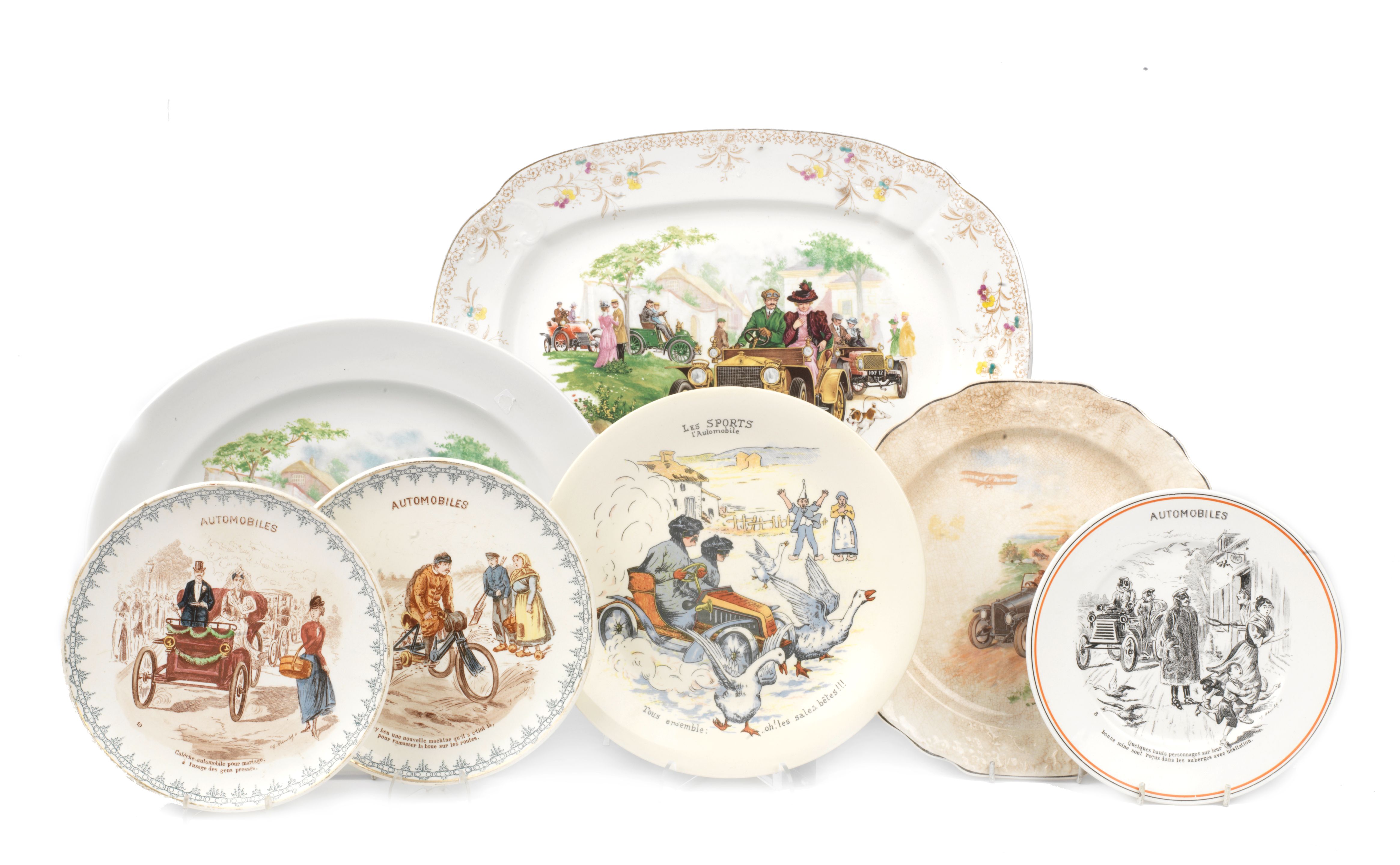 Bonhams Cars : Seven plates decorated with Veteran motoring scenes, ((7))