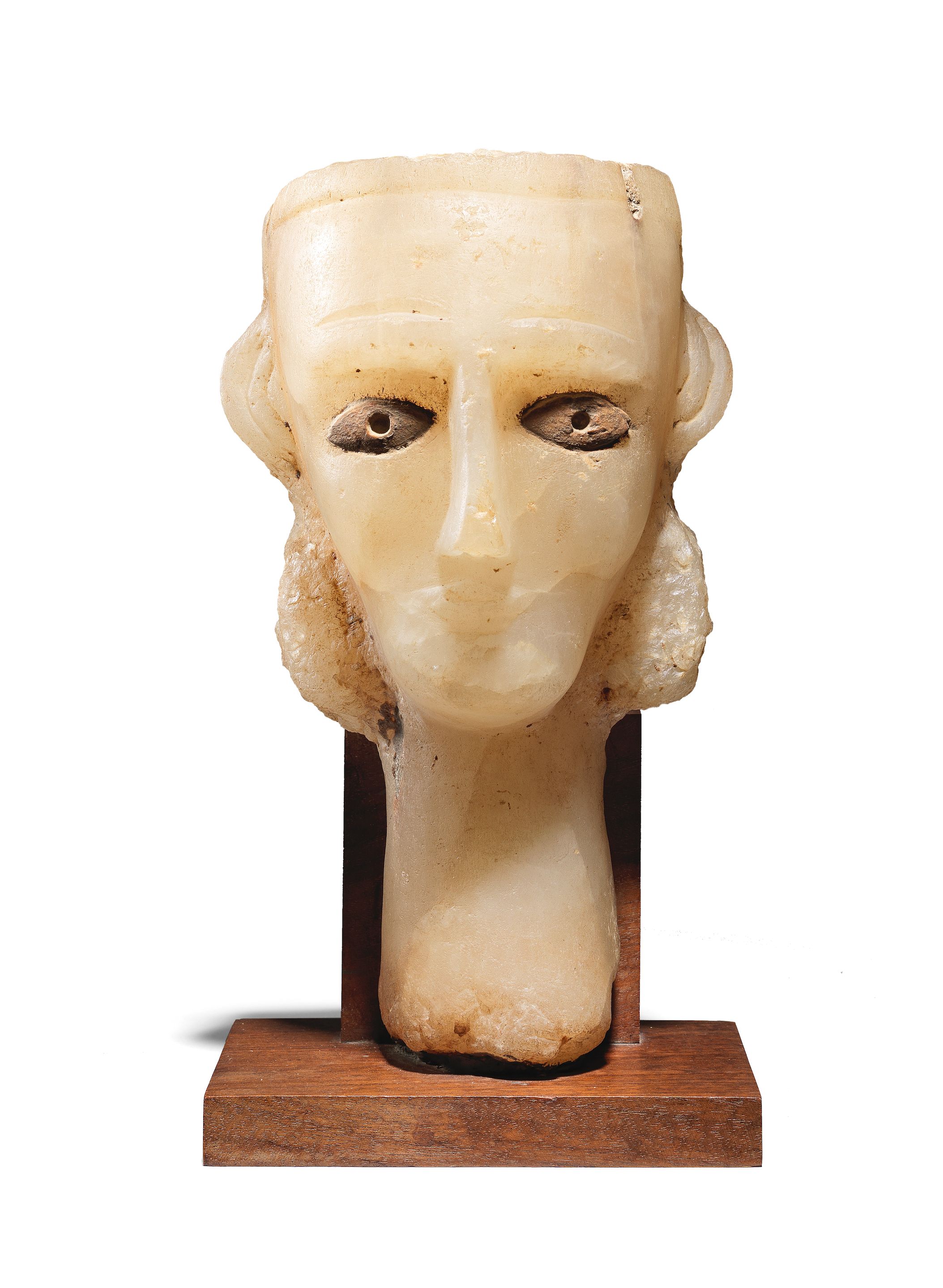 Bonhams : A South Arabian alabaster head of a woman