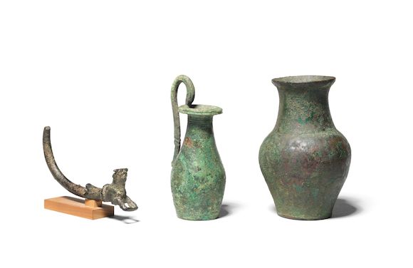 Bonhams : An Etruscan bronze olpe, a Roman bronze finial and a Roman ...