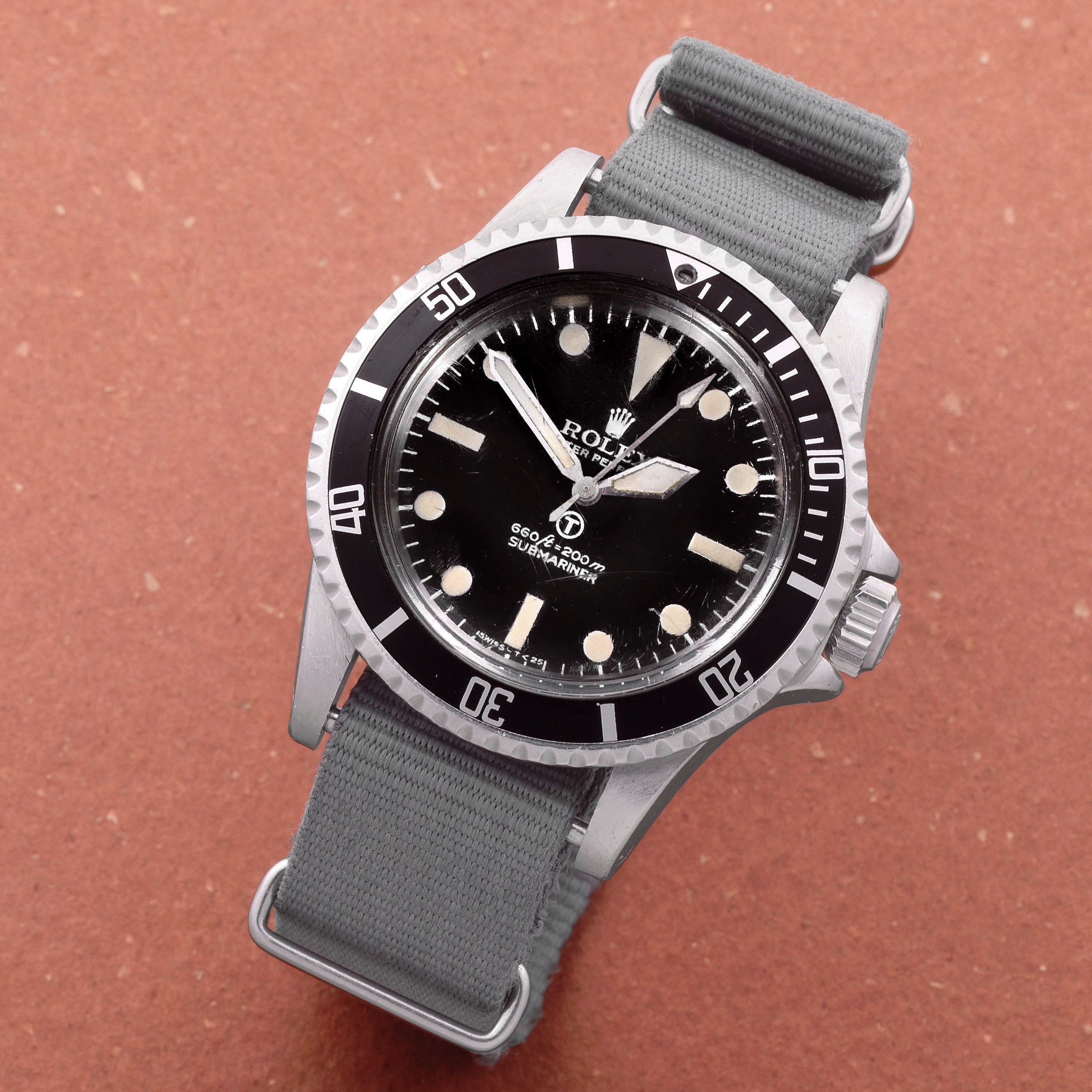 Bonhams : Rolex. A rare military issue stainless steel automatic ...